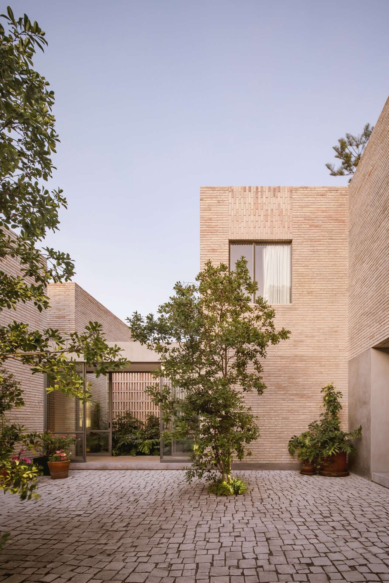 Photo 2 of 21 in A Brick Home in Mexico City Encloses a Series of Lush ...