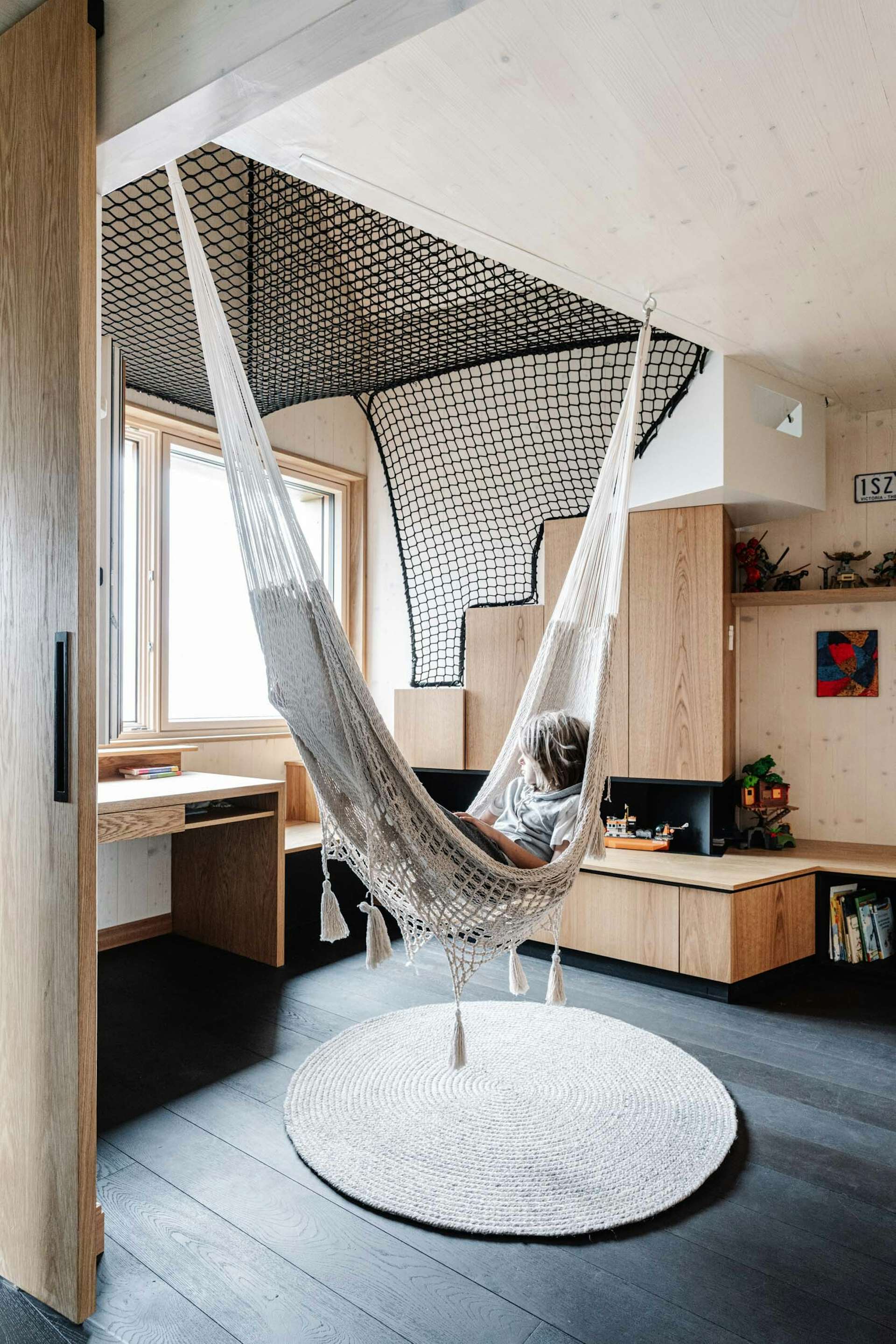 Photo 18 of 29 in A Striking Black Residence Energizes a Neglected Lot ...