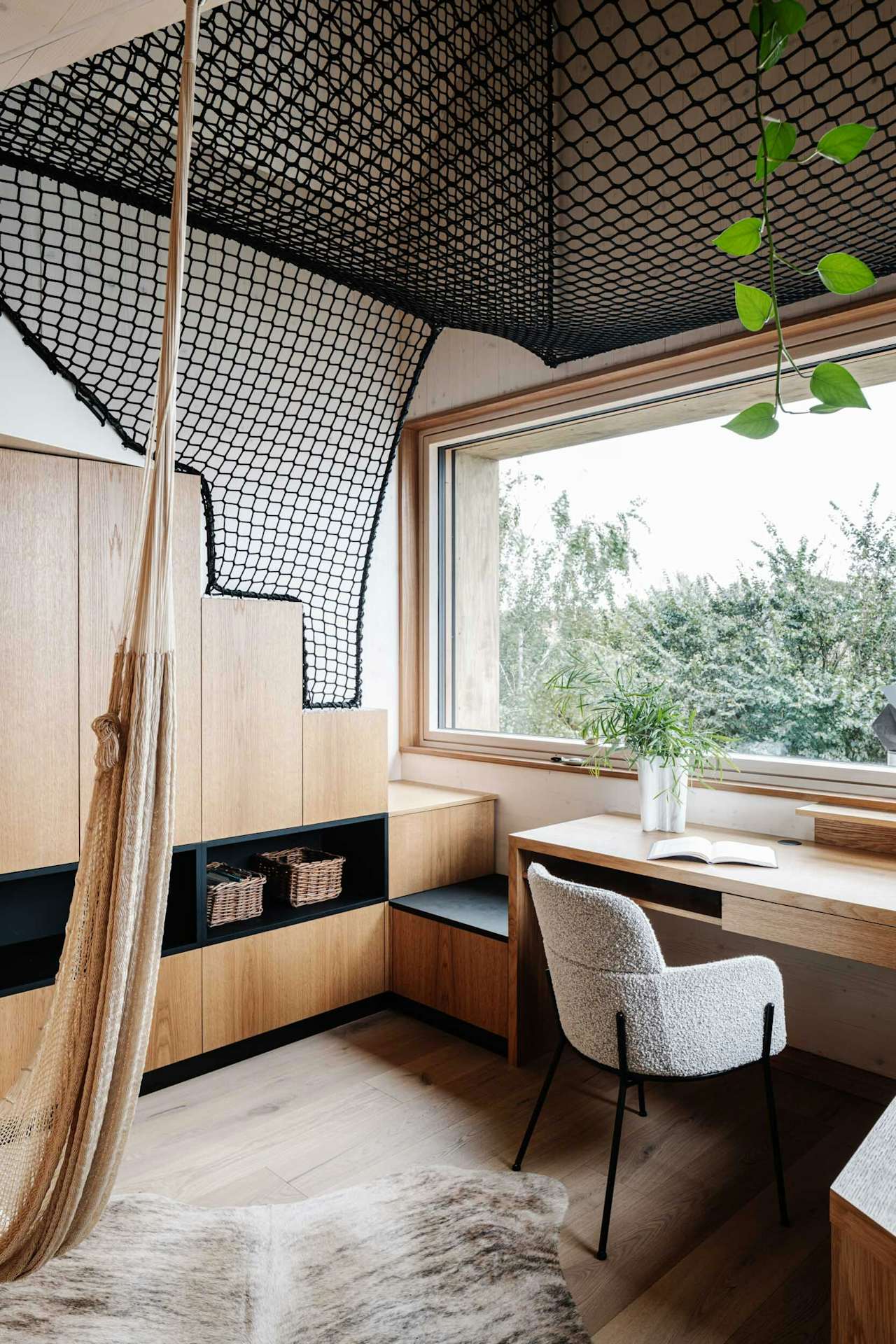 Photo 17 of 29 in A Striking Black Residence Energizes a Neglected Lot ...