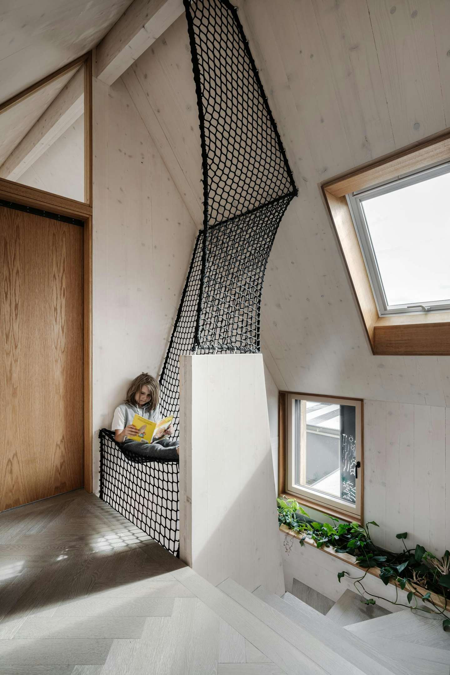 Photo 21 of 29 in A Striking Black Residence Energizes a Neglected Lot ...