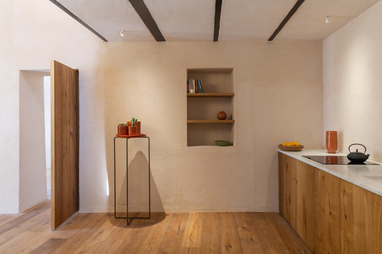 A Floating Iron Stair Cuts Through a Bladesmith’s Workshop Turned ...