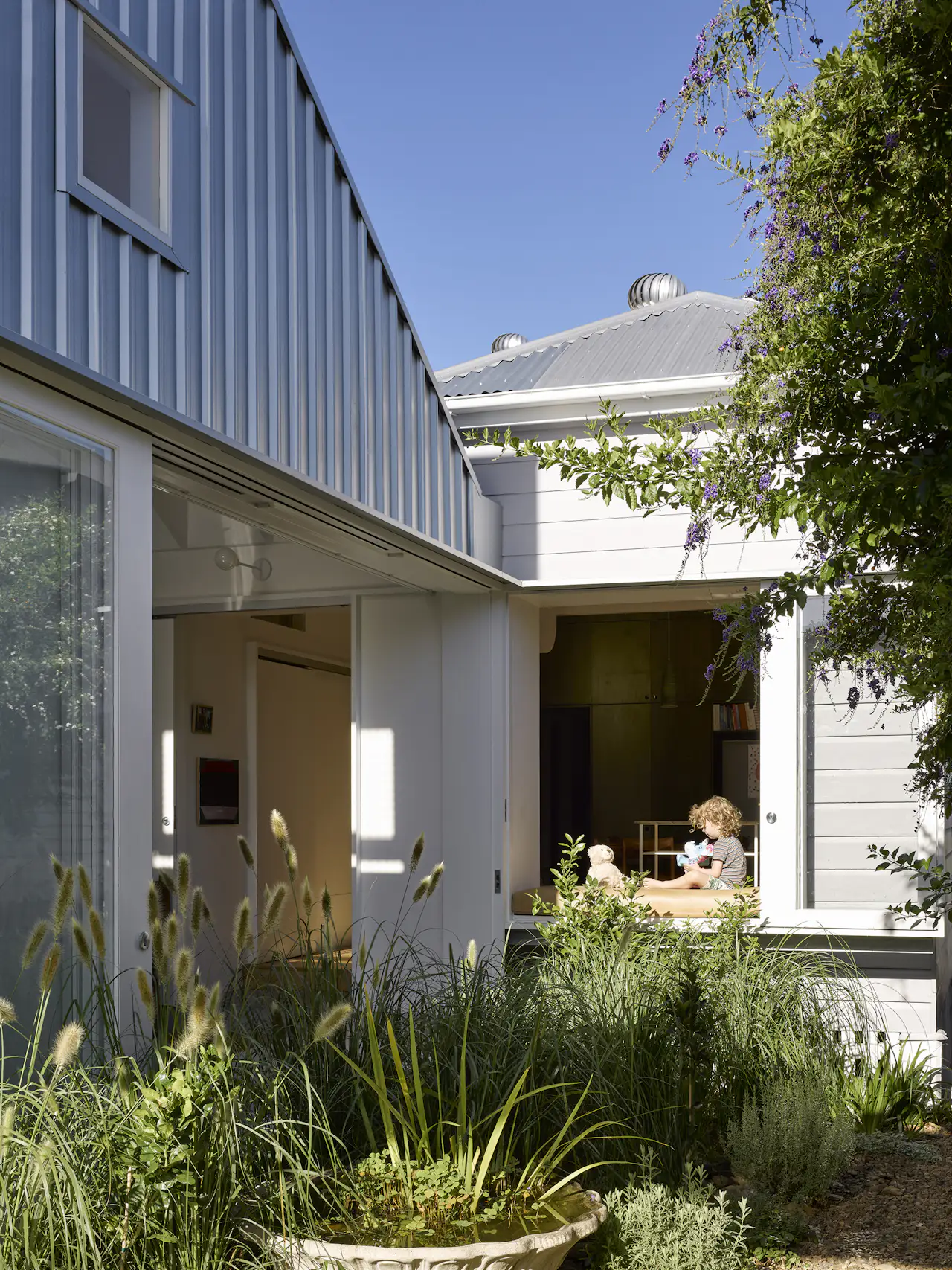 Photo 2 of 15 in A Family’s Queenslander Cottage Is Cracked Open With ...