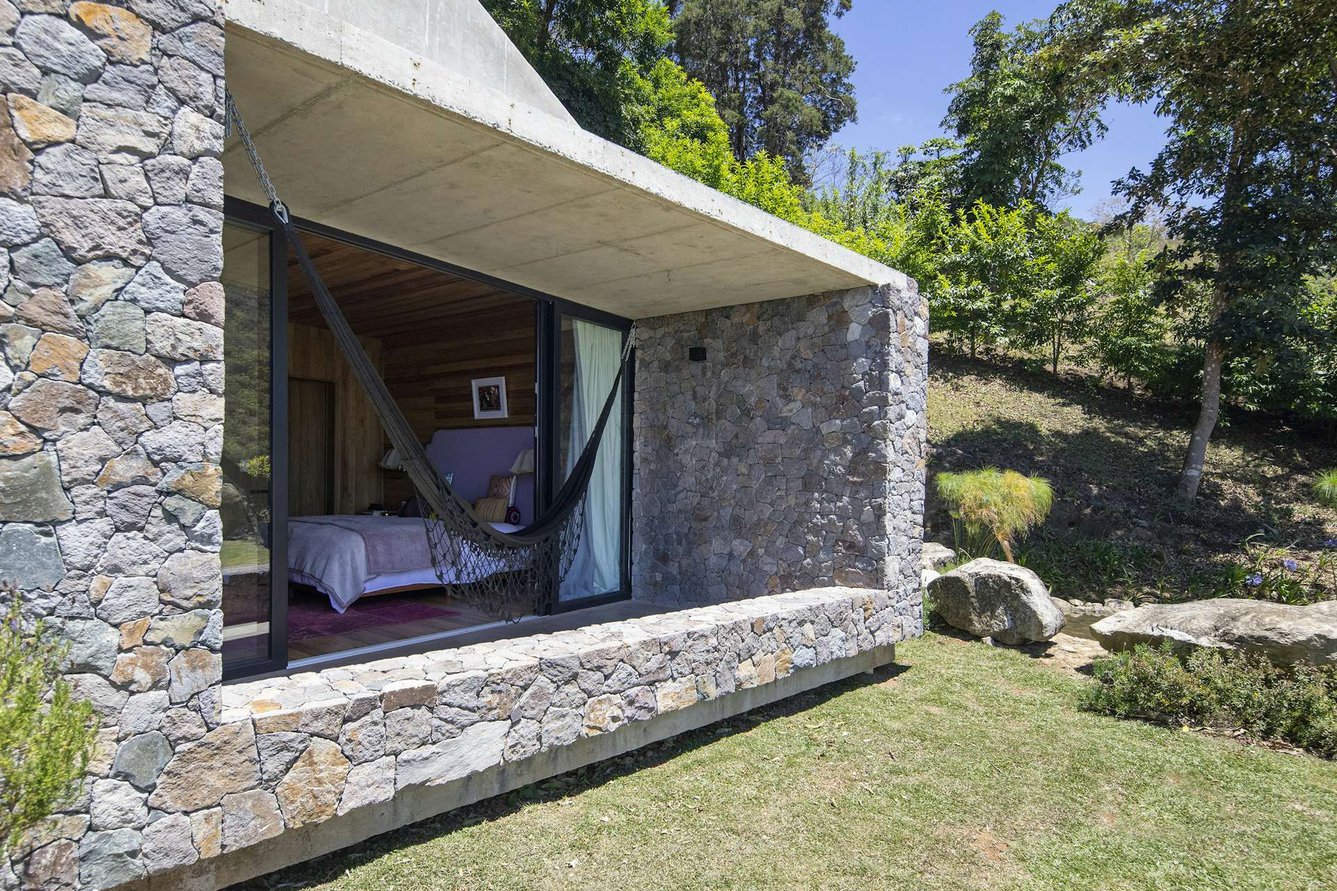 Photo 13 of 21 in A Brutalist-Inspired, Off-Grid Retreat Rises in a ...