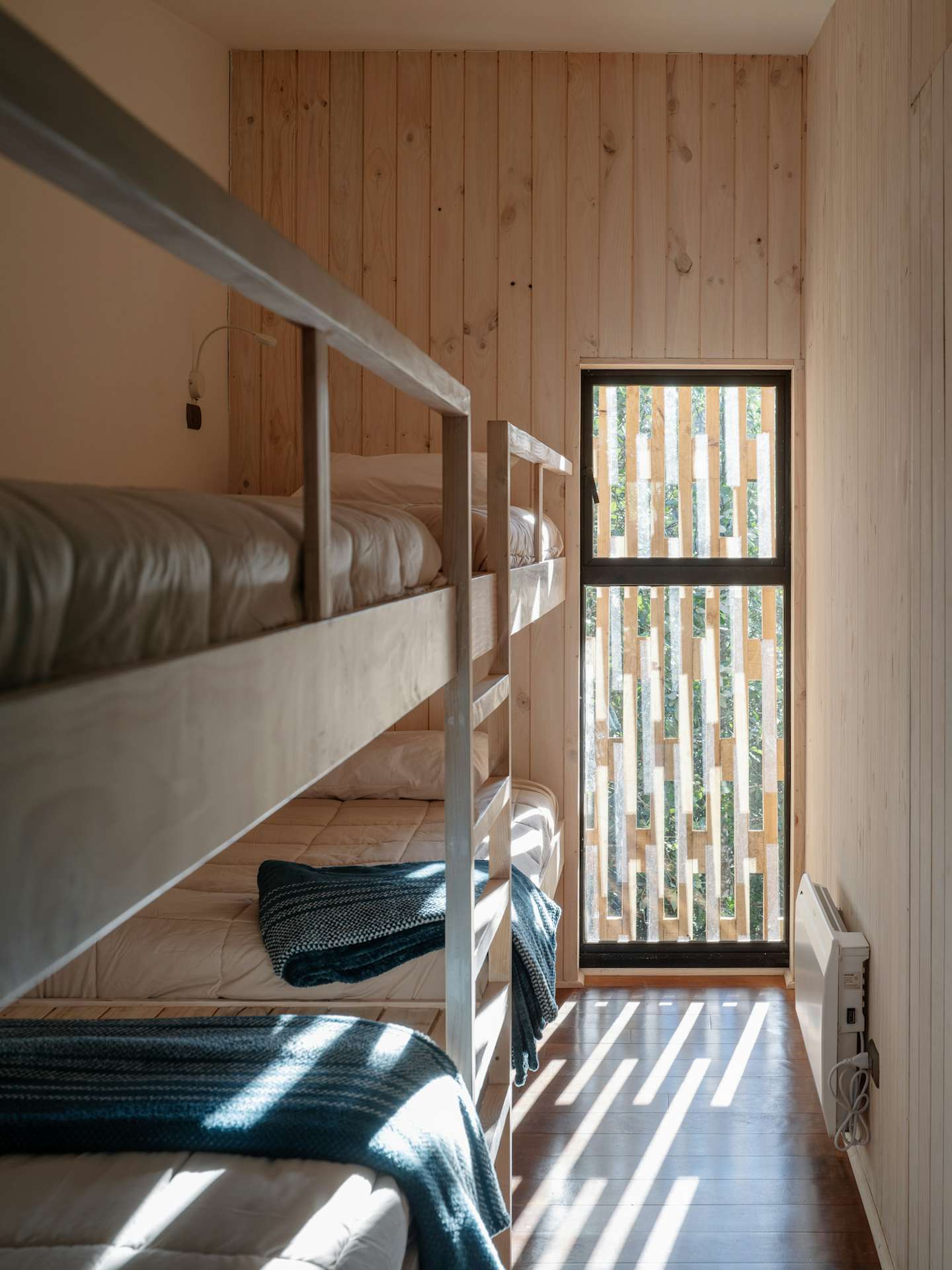 A Black Roof and Central Courtyard Make This Chilean Cabin Vanish Into ...