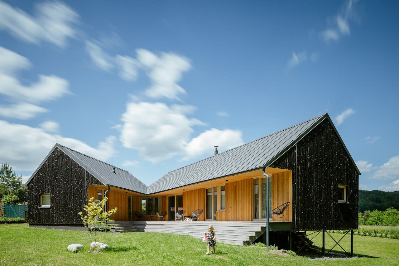 This Black Gable Country Home Looks Like It Was Broken in Half - Dwell