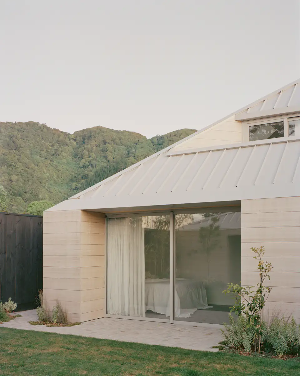 Photo 13 of 15 in Warm Wood Finishes Sandwich the White Interiors of a ...