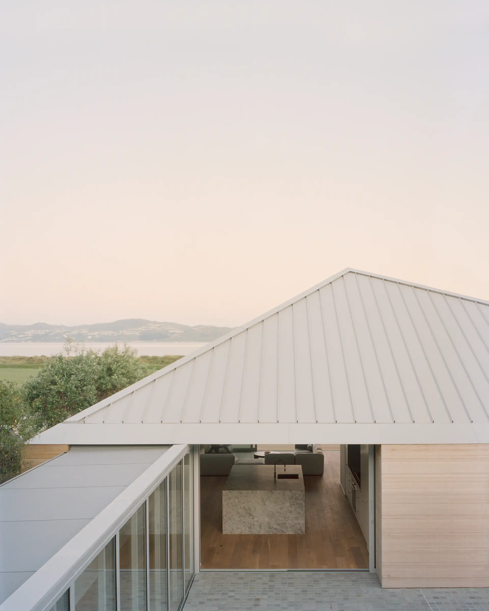 Photo 14 of 15 in Warm Wood Finishes Sandwich the White Interiors of a ...