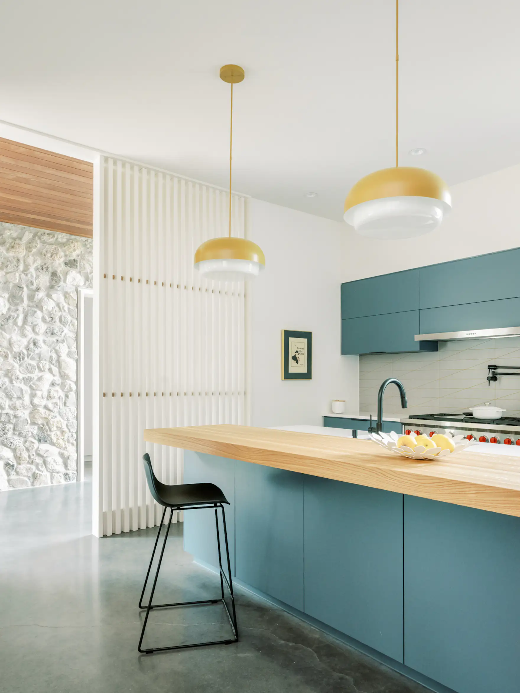 Tile, Texas Stone, and Concrete Rule in This Soaring Houston Home - Dwell