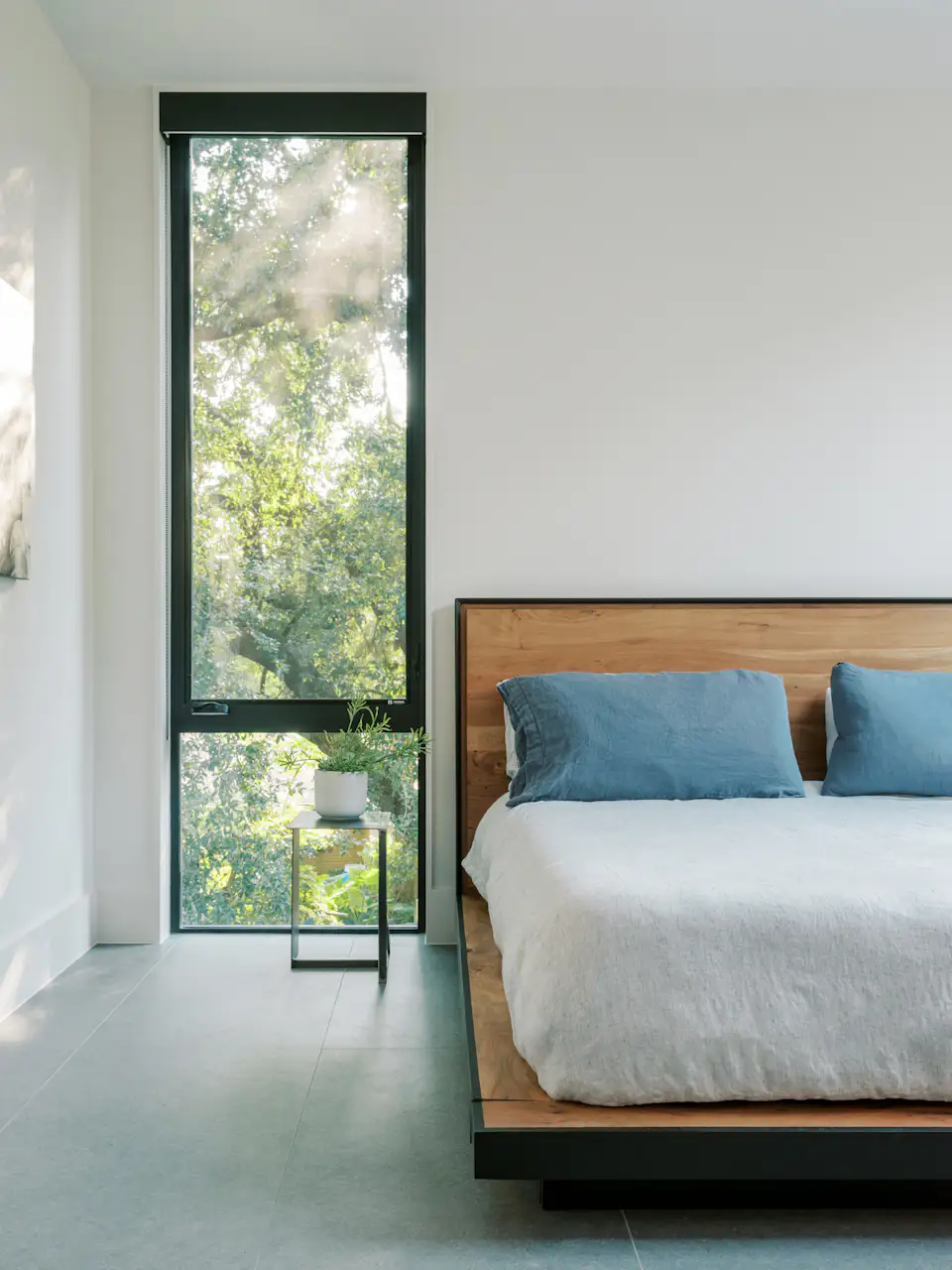 Tile, Texas Stone, and Concrete Rule in This Soaring Houston Home - Dwell