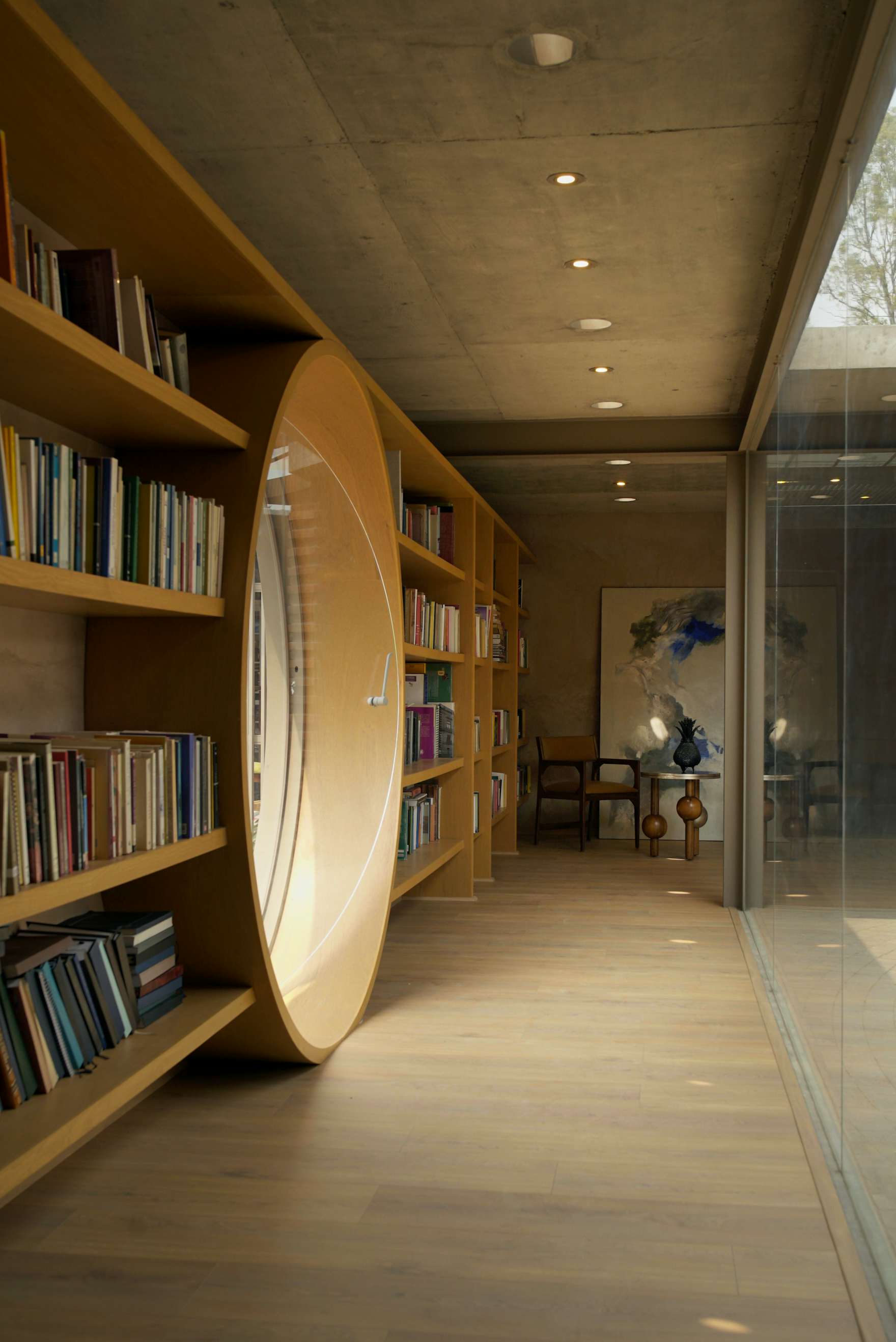 Photo 6 of 14 in A Brick-and-Concrete Home With a Library Emphasizes ...