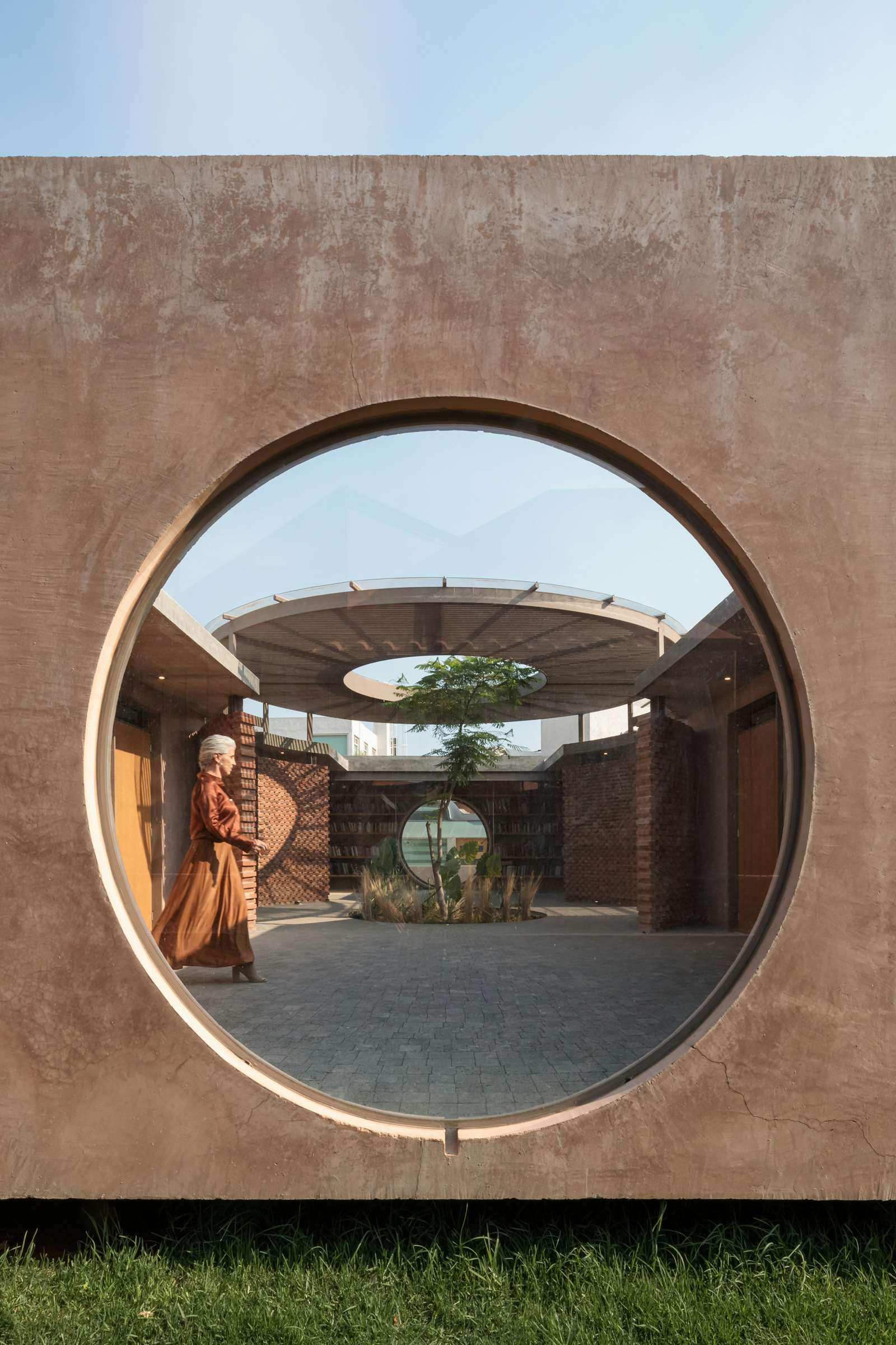 Photo 11 of 14 in A Brick-and-Concrete Home With a Library Emphasizes ...