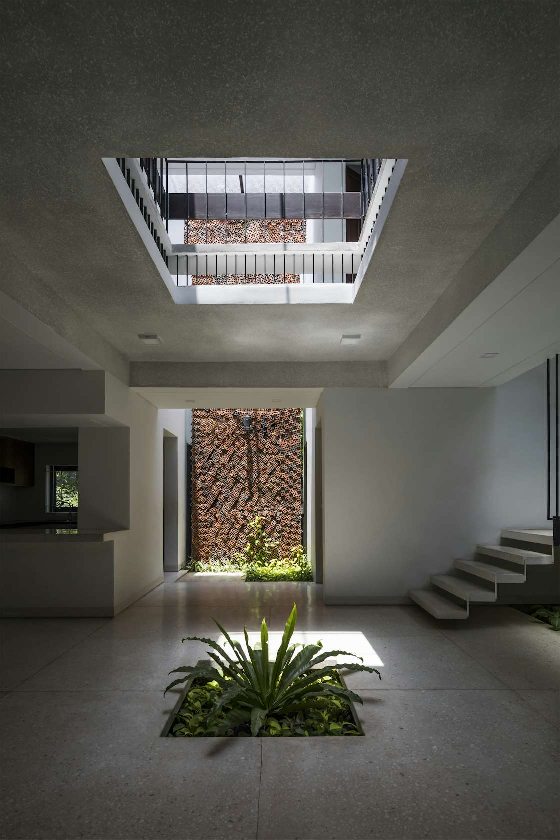 Photo 13 of 23 in A Biophilic Home in Vietnam Impresses With a Hollow ...
