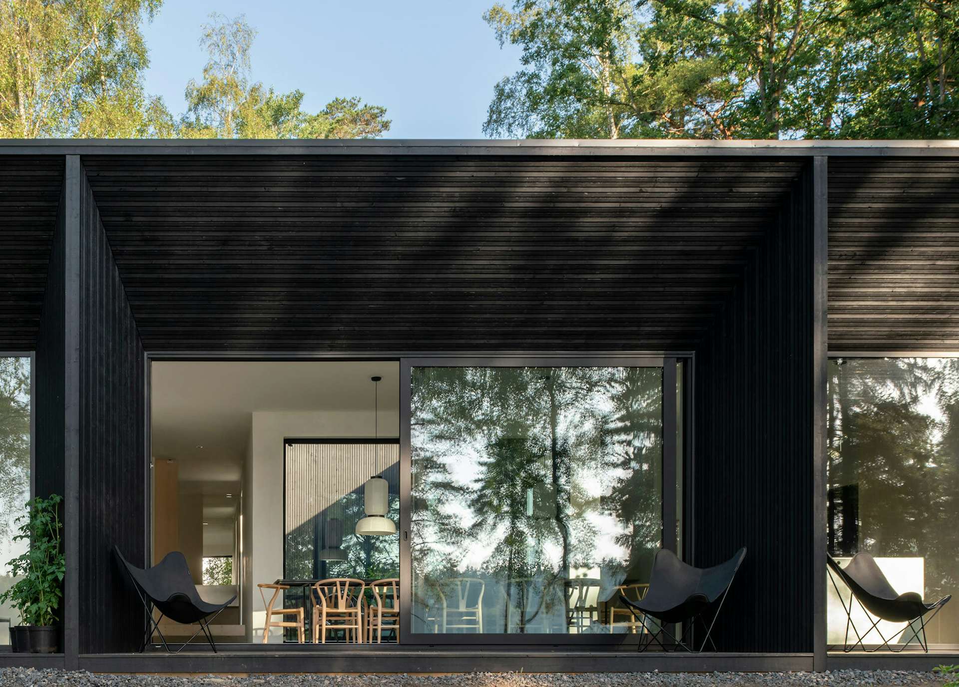 Photo 14 of 33 in Rhythmic Black Timber Makes This Swedish Cabin Pop ...