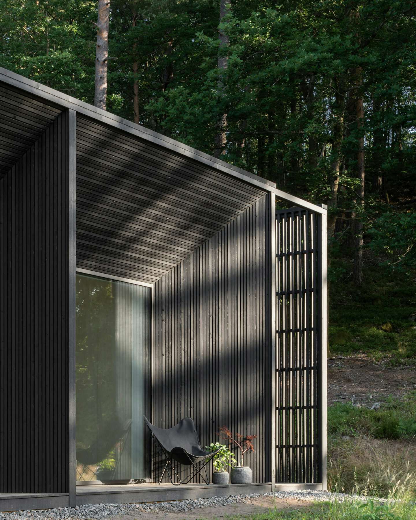 Photo 13 of 33 in Rhythmic Black Timber Makes This Swedish Cabin Pop ...