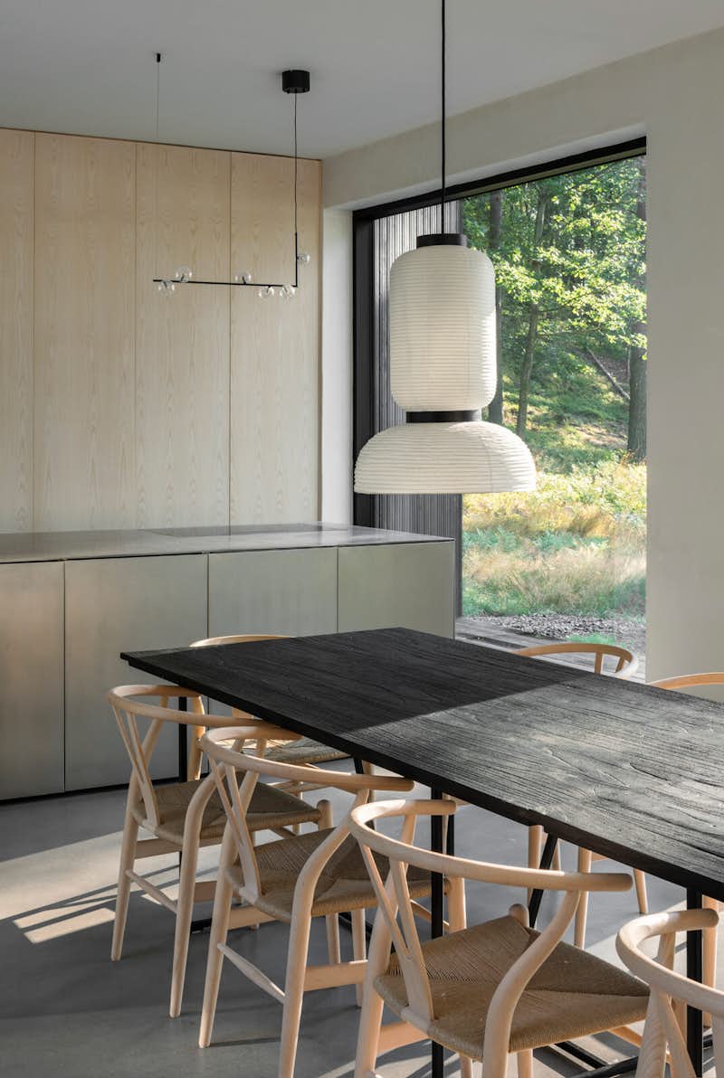 Photo 22 of 33 in Rhythmic Black Timber Makes This Swedish Cabin Pop ...