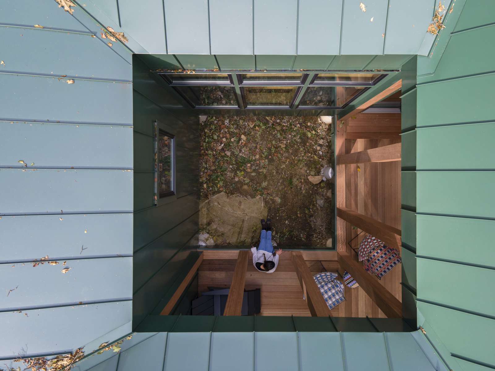 Photo 7 of 8 in A Metal-Clad Cabin Hovers Above the Forest Floor in ...