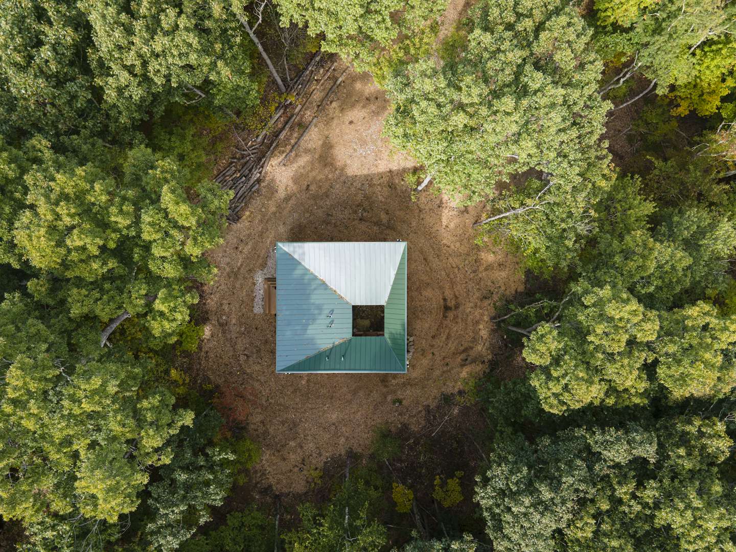 Photo 7 of 8 in A Metal-Clad Cabin Hovers Above the Forest Floor in ...