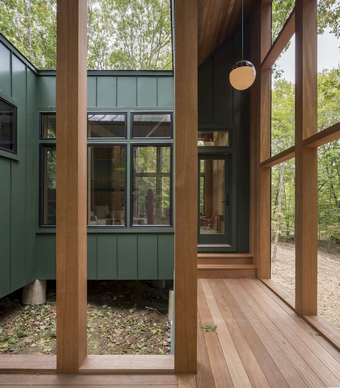 Photo 5 of 8 in A Metal-Clad Cabin Hovers Above the Forest Floor in ...