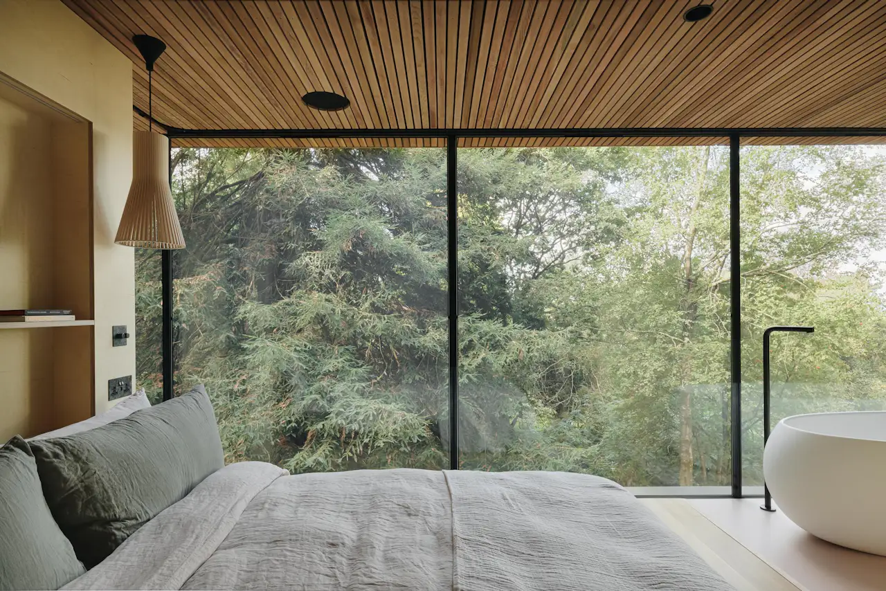 Photo 18 of 20 in A Prefab Cabin With Massive Windows Touches Down ...