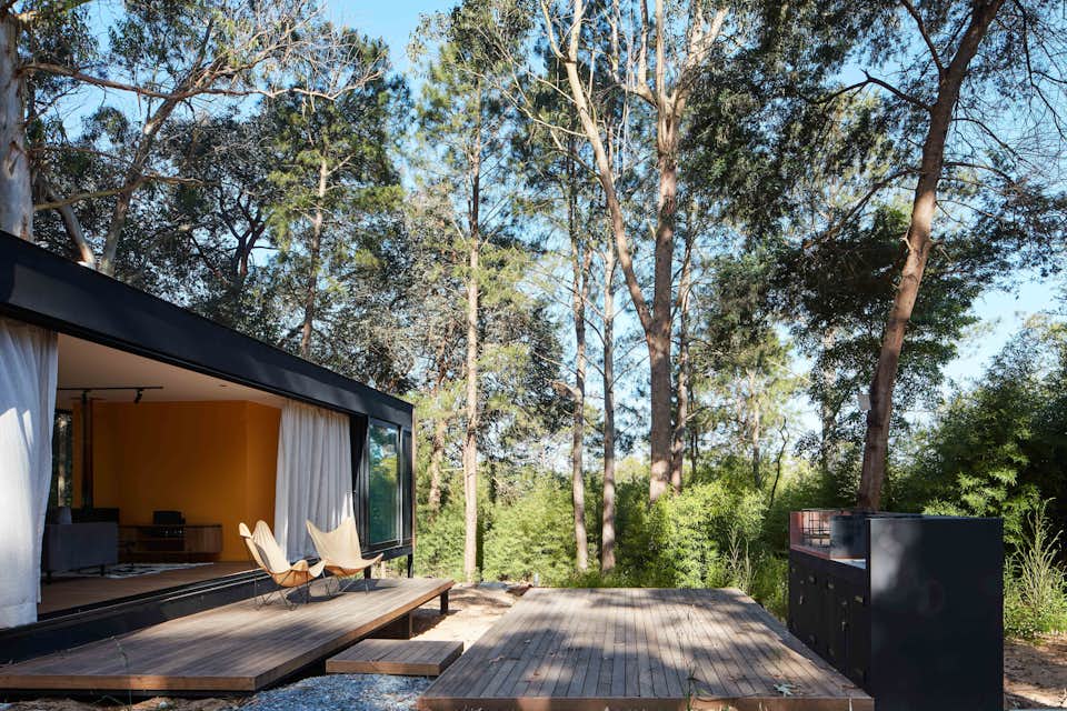 Photo 8 of 15 in A Prefab Cabin Camouflaged in a South American Forest ...