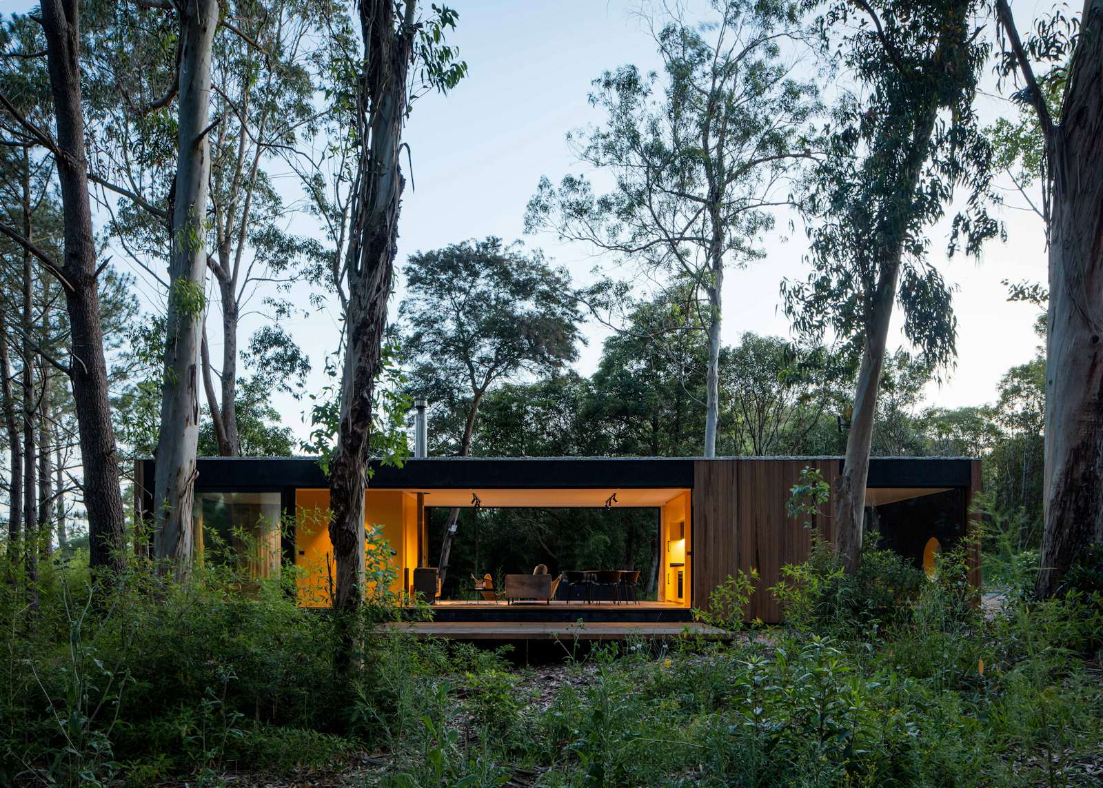 Photo 2 of 15 in A Prefab Cabin Camouflaged in a South American Forest ...
