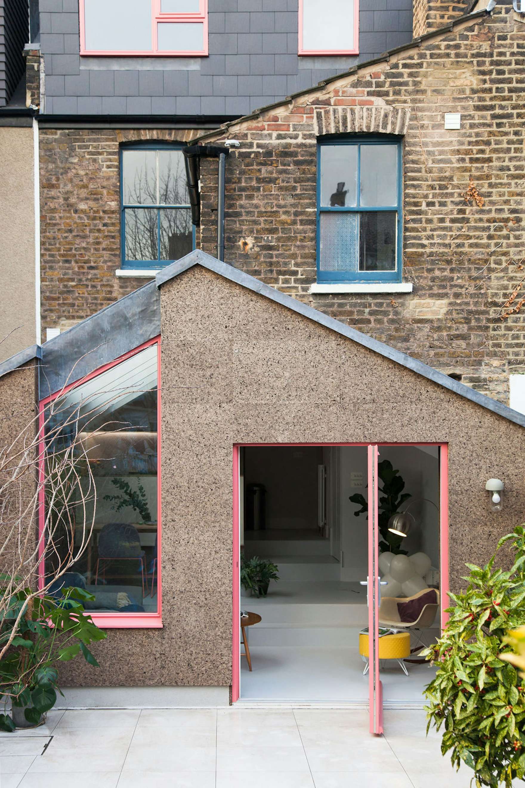 Photo 1 of 17 in A Cork-Clad Extension With Playful Pink Trim Is the ...