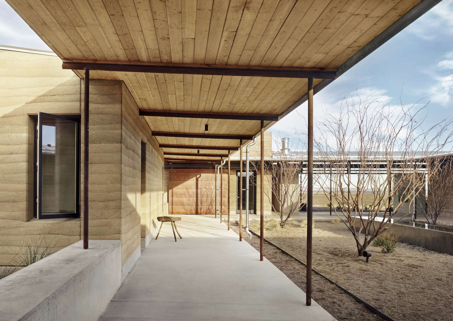 Photo 5 of 22 in Monolithic Rammed Earth Walls Keep This Marfa Ranch ...