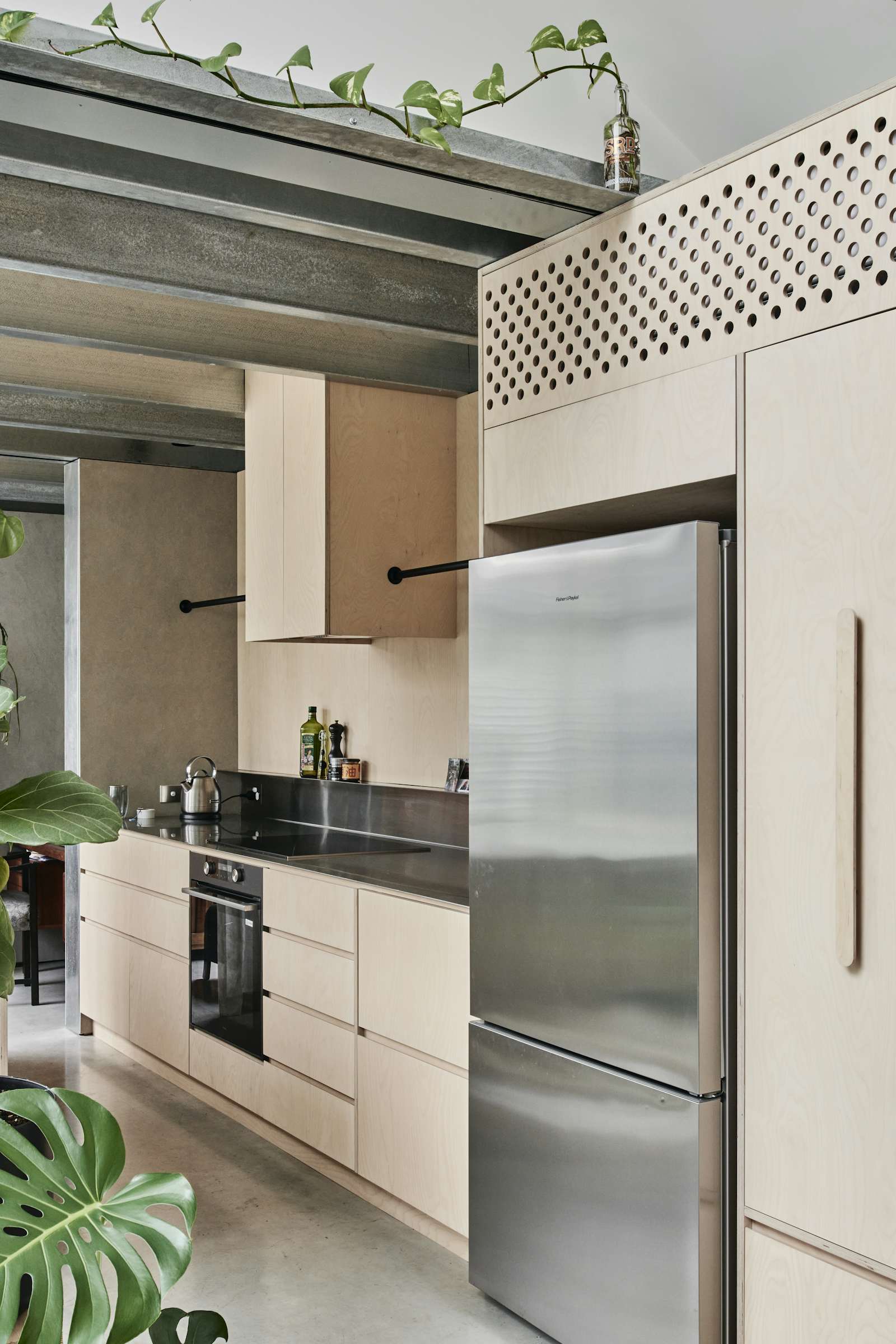 Steel Cladding and a Roller Door Forge a Melbourne Home With Its ...