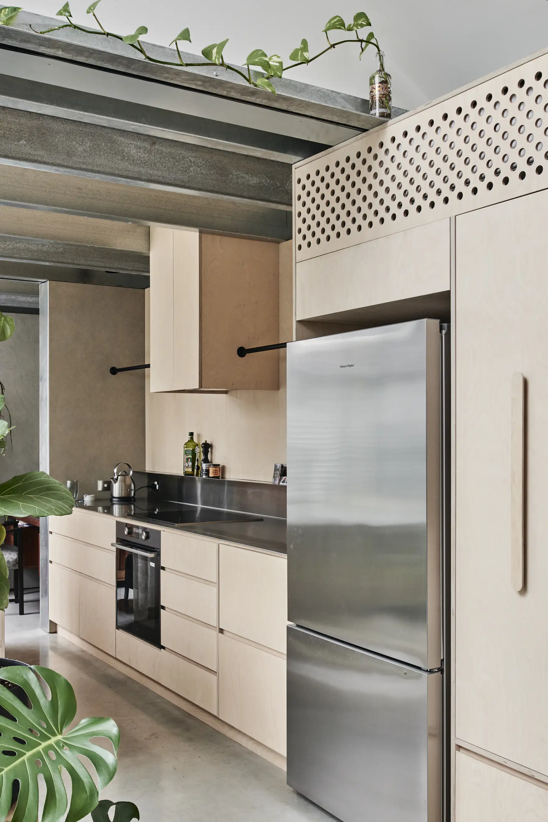 Steel Cladding and a Roller Door Forge a Melbourne Home With Its ...