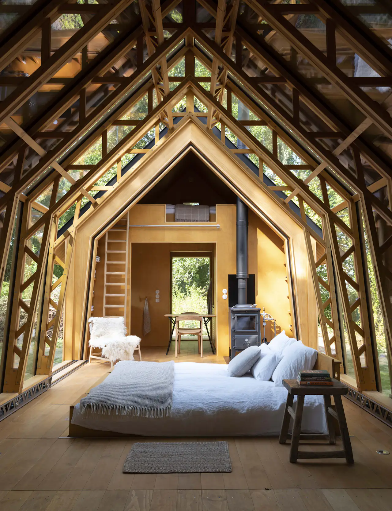 This $480K Prefab Cabin Slides Apart to Reveal a Glass Enclosed Room ...