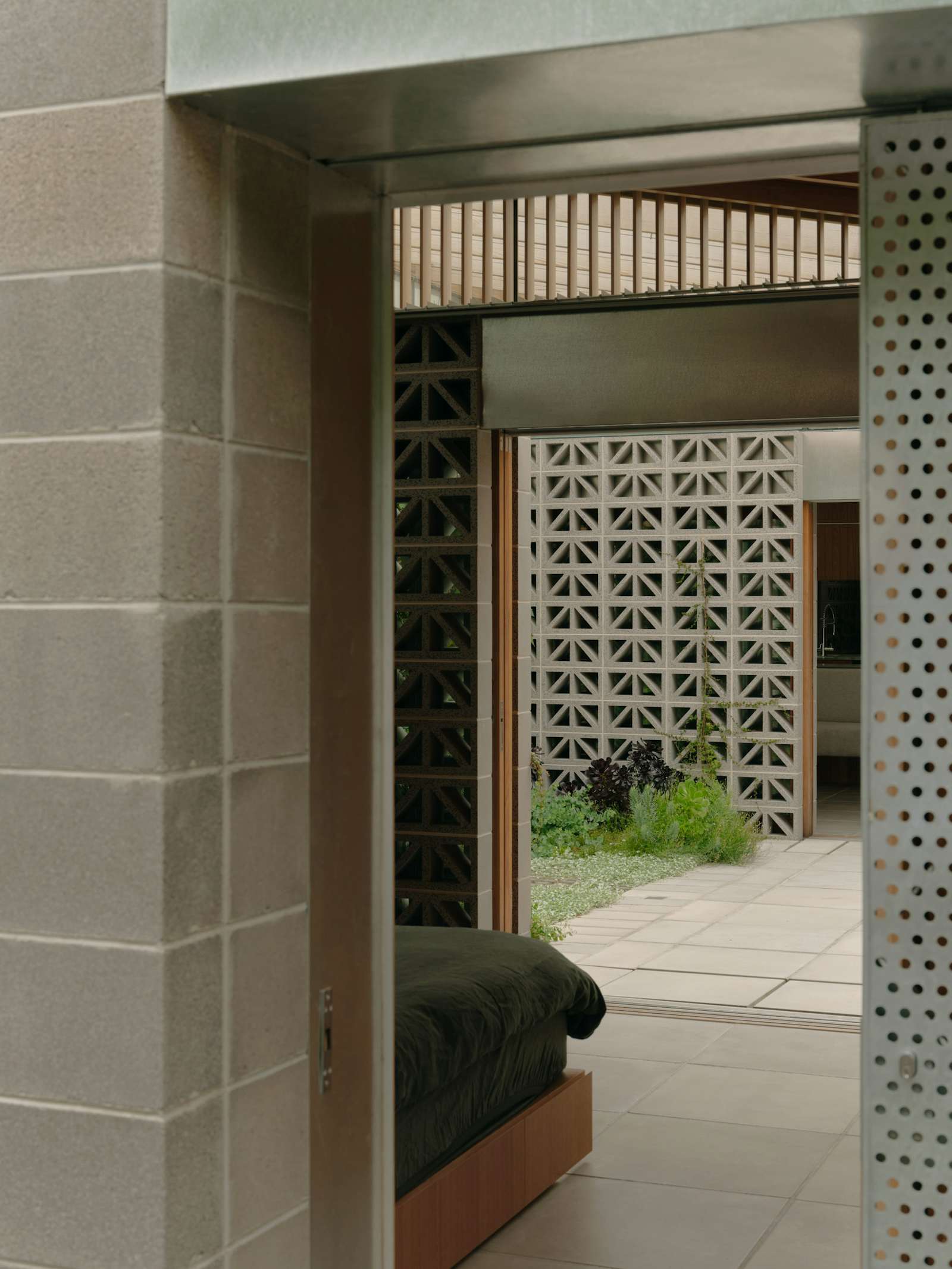 Photo 10 of 16 in A Breeze Block Courtyard Is the Only Way to Access ...