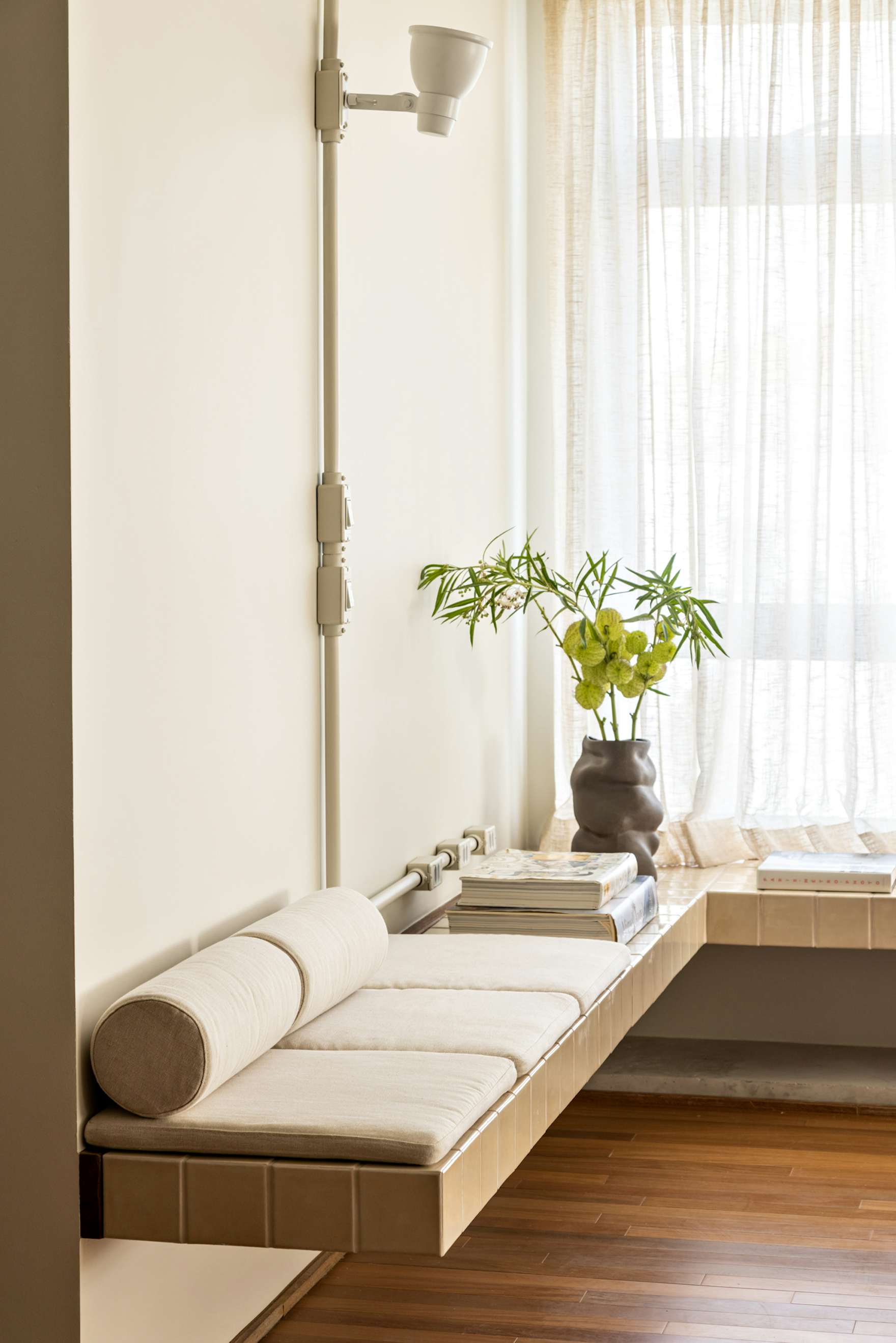 Creamy Tile Polishes Up a Brazil Apartment’s Rough Concrete Edges - Dwell