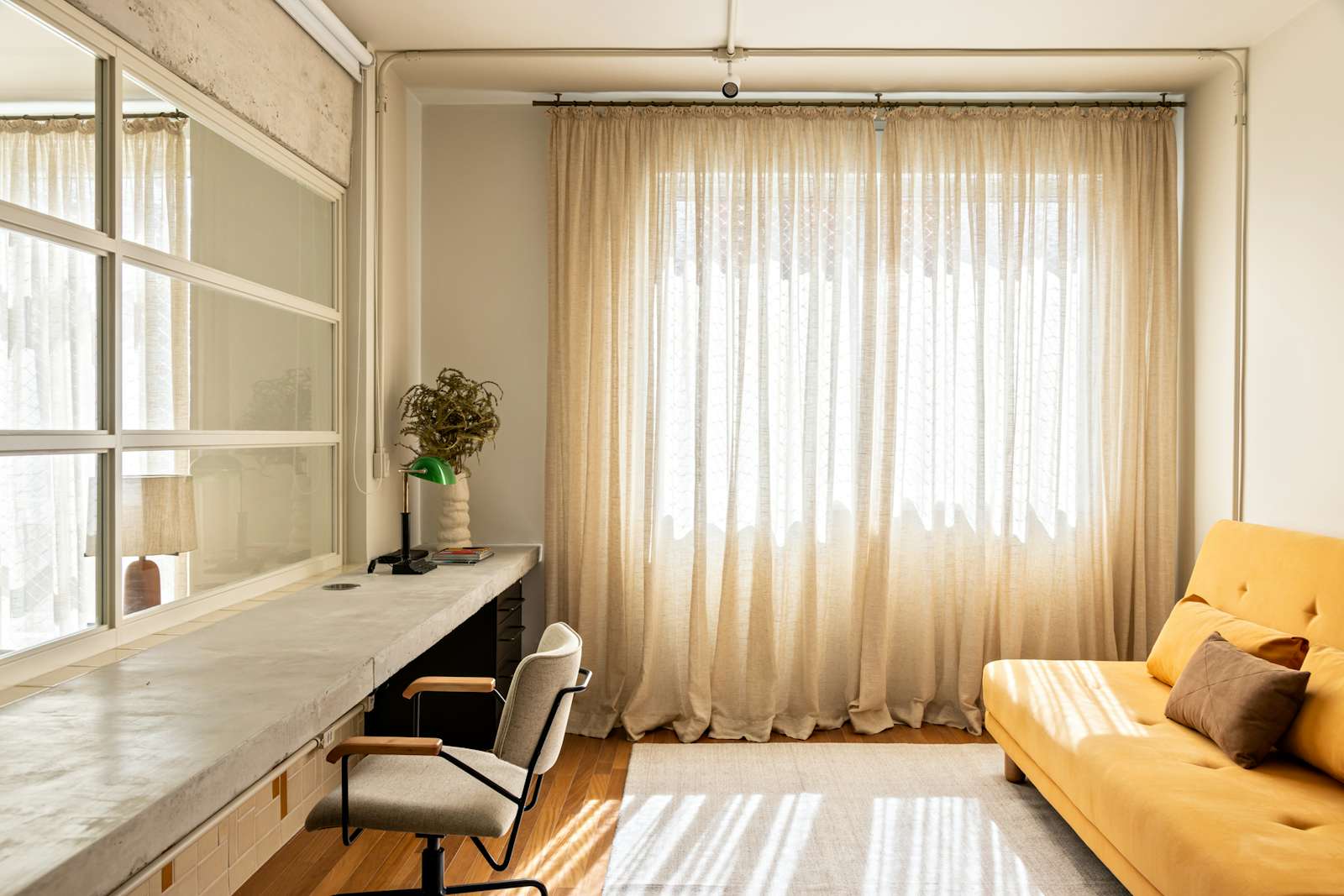 Creamy Tile Polishes Up a Brazil Apartment’s Rough Concrete Edges - Dwell