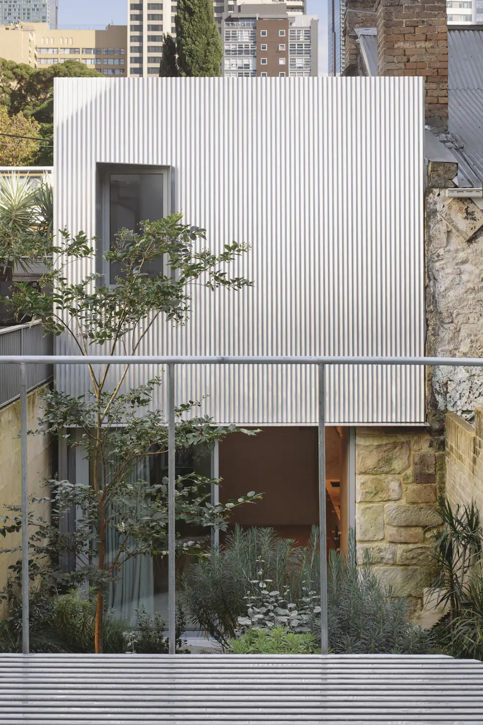 This Narrow Lot in Australia Holds Two Homes—But One’s Stone, and the ...