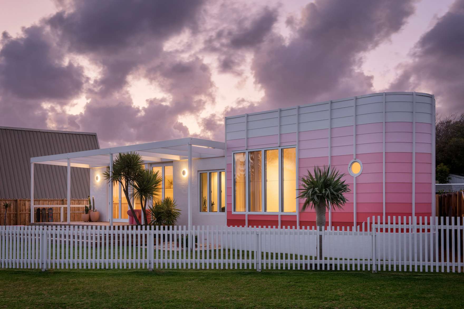 Photo 2 of 23 in This Elevated Australian Beach Shack Has a Vaporwave Sunset Facade - Dwell