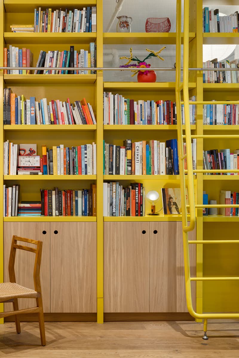 Photo 5 of 15 in A Yellow Floor-to-Ceiling Library Wall Brightens Up ...