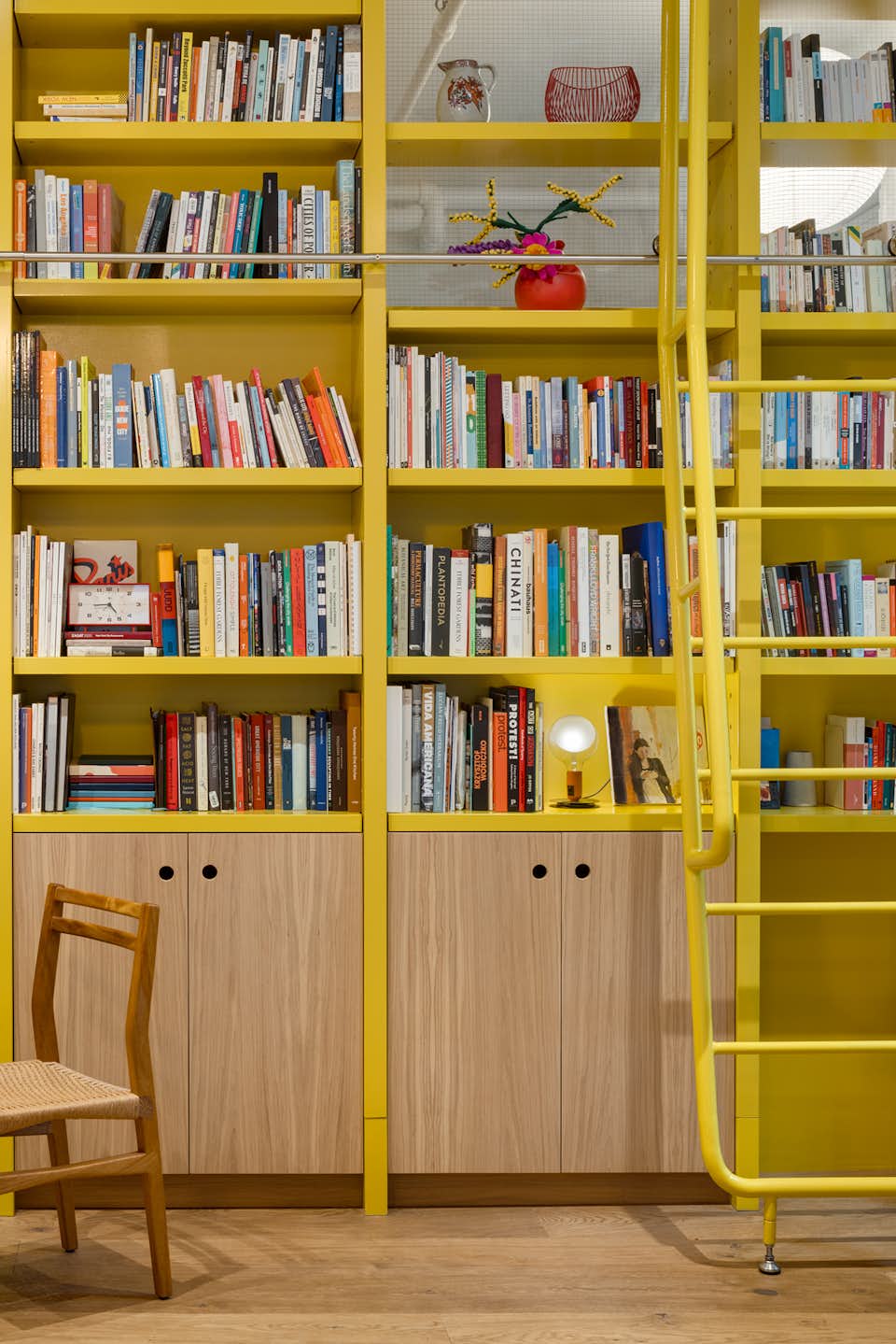 Photo 5 of 15 in A Yellow Floor-to-Ceiling Library Wall Brightens Up ...