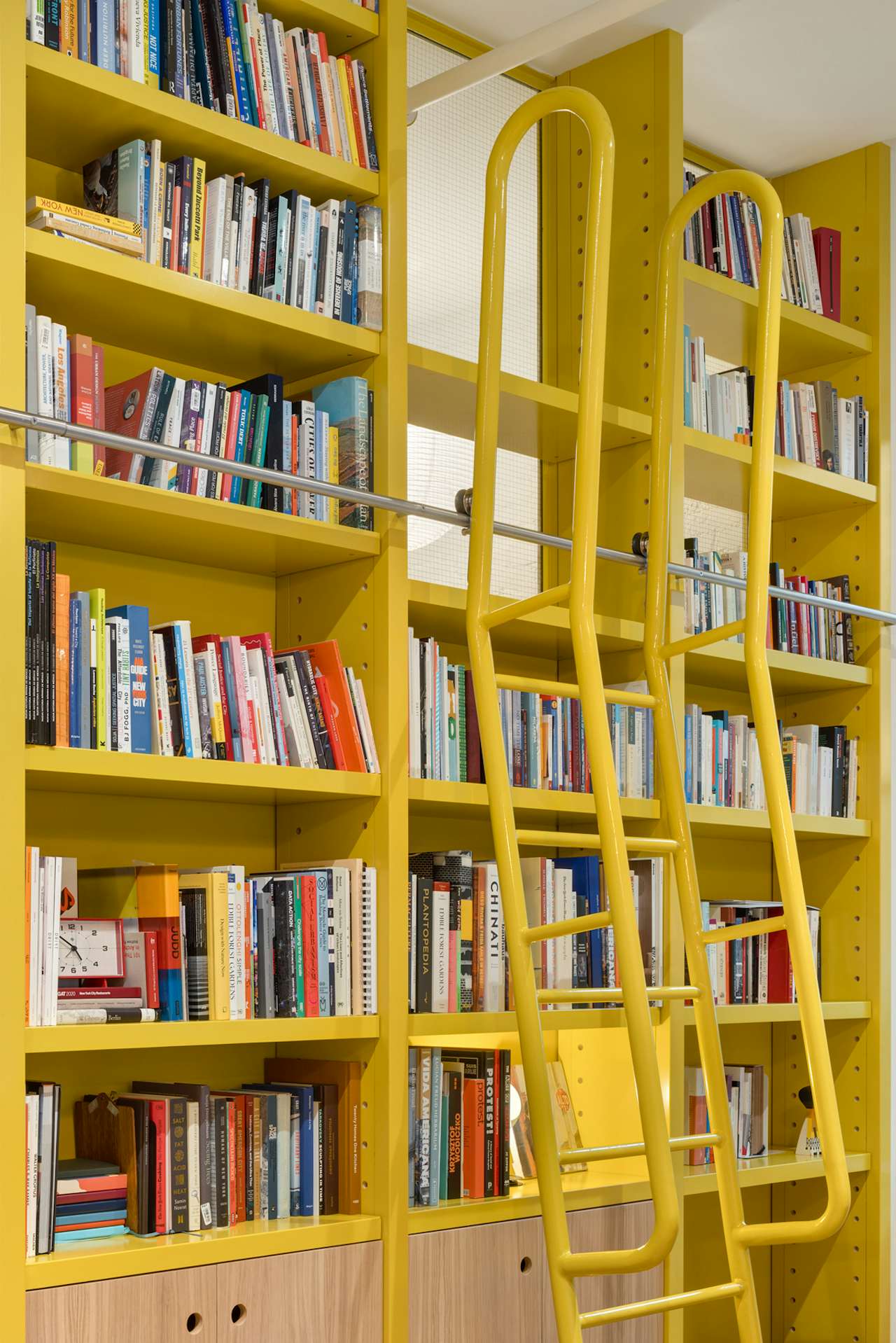 Photo 4 of 15 in A Yellow Floor-to-Ceiling Library Wall Brightens Up ...