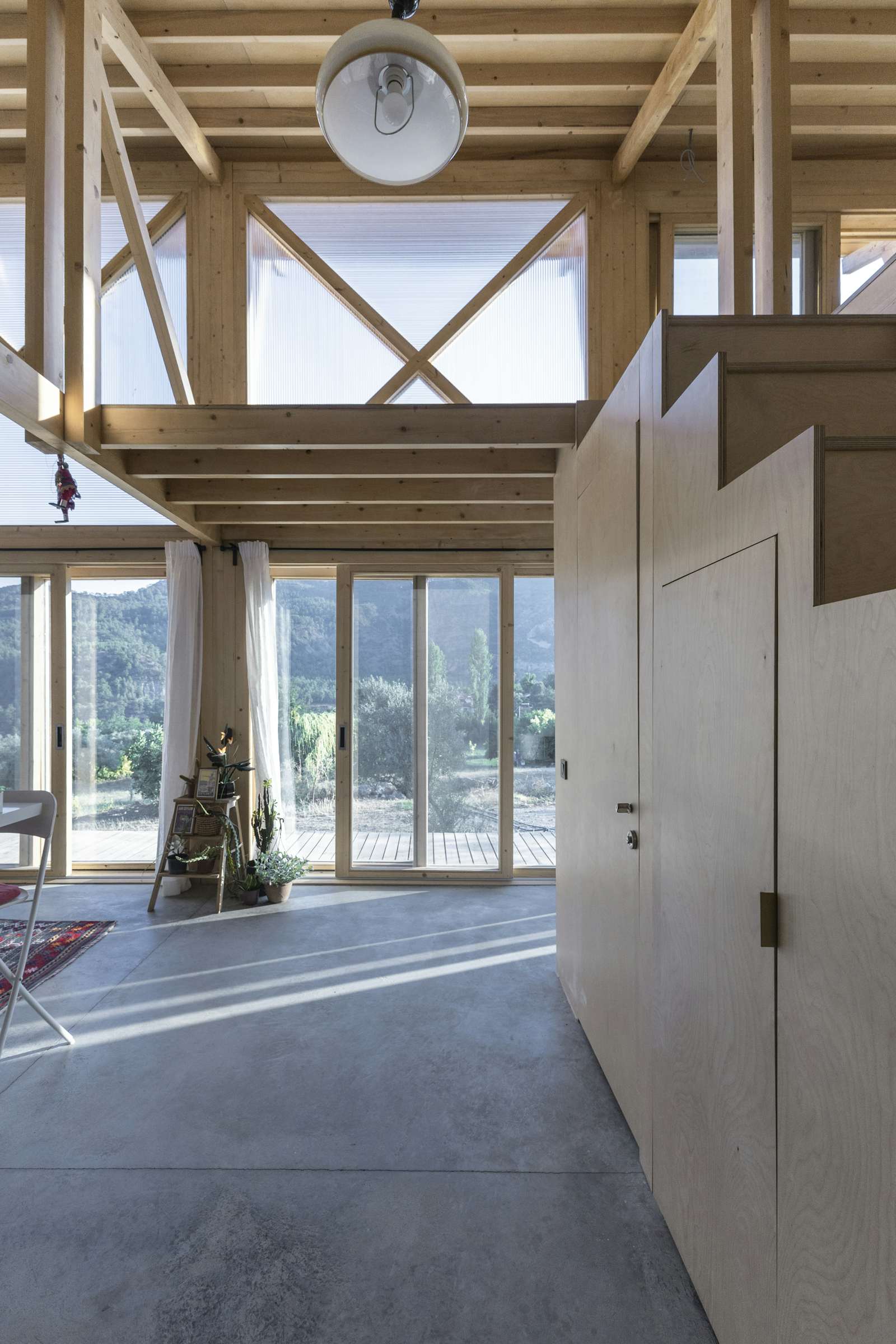 Photo 9 of 15 in Glass or Stone? This Mediterranean Home Splits the ...