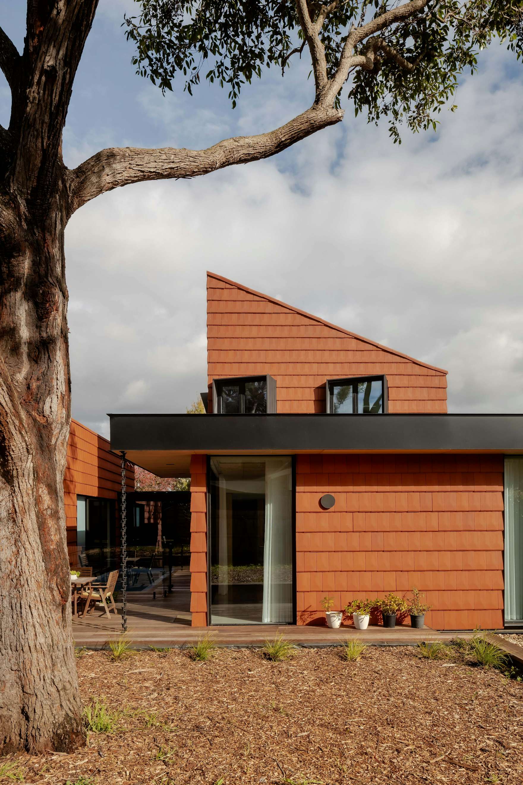 Photo 3 of 17 in Terra-Cotta Shingles Cover a Multigenerational Home in ...