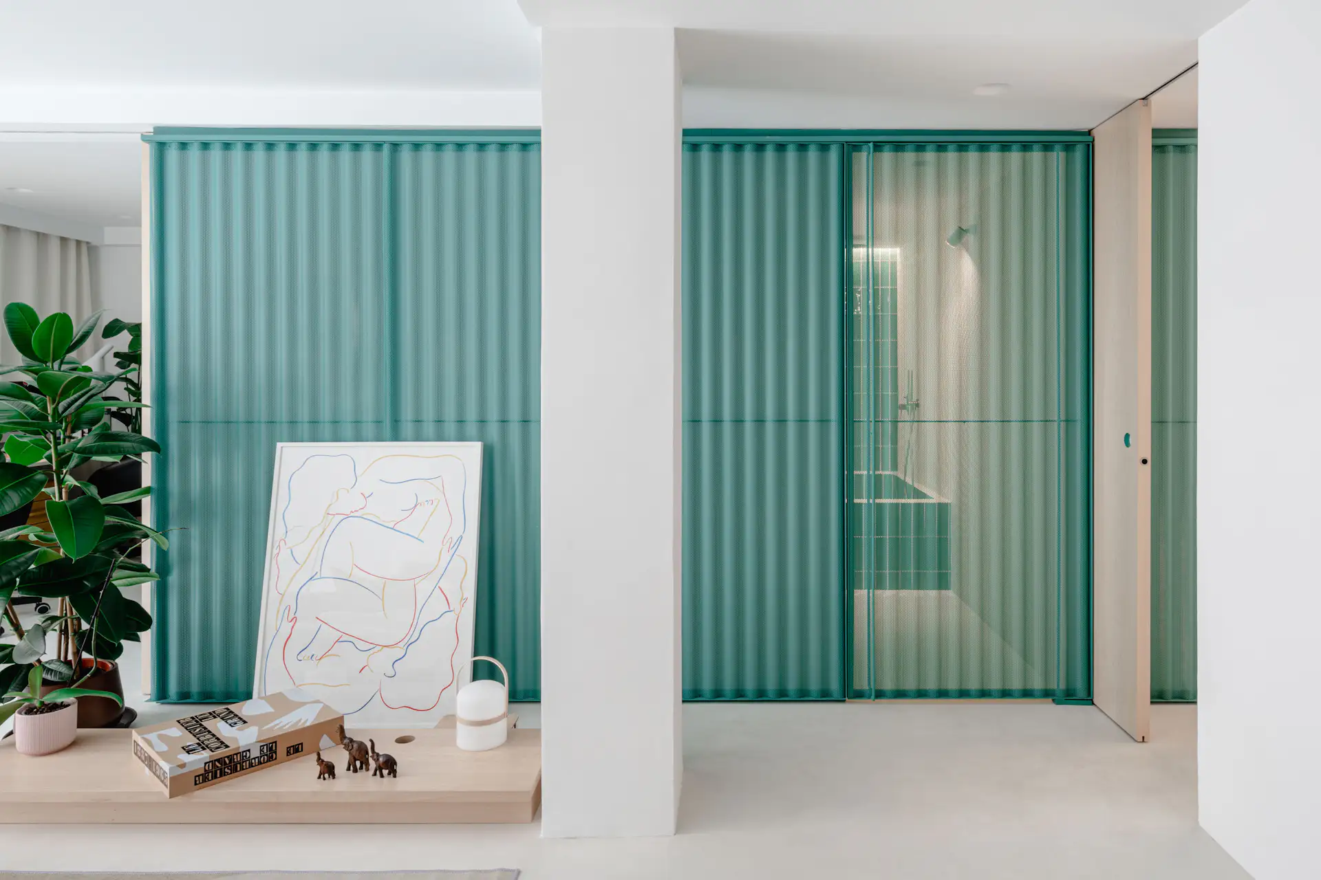 Photo 9 of 13 in A Perforated Metal Box Hides the Bathroom in This ...