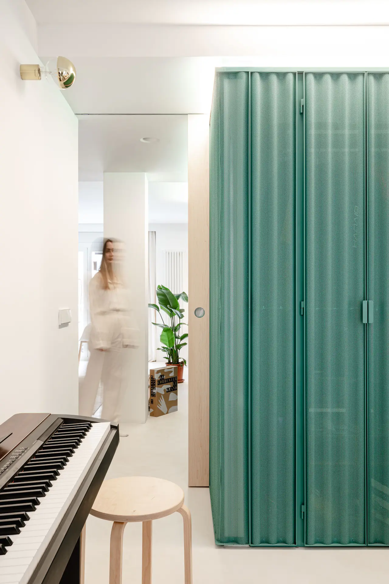 Photo 13 of 13 in A Perforated Metal Box Hides the Bathroom in This ...