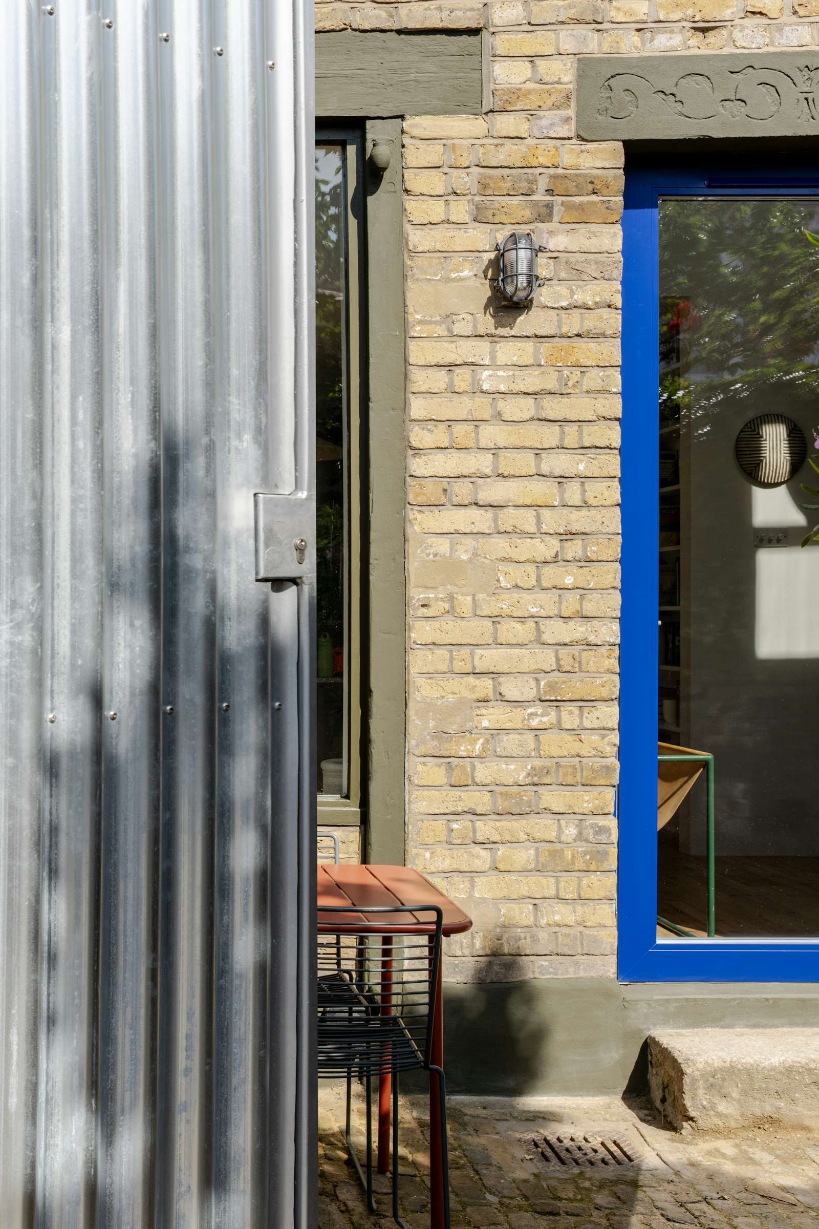 Photo 12 of 15 in An Electric-Blue Stair Energizes a Tired London Coach ...