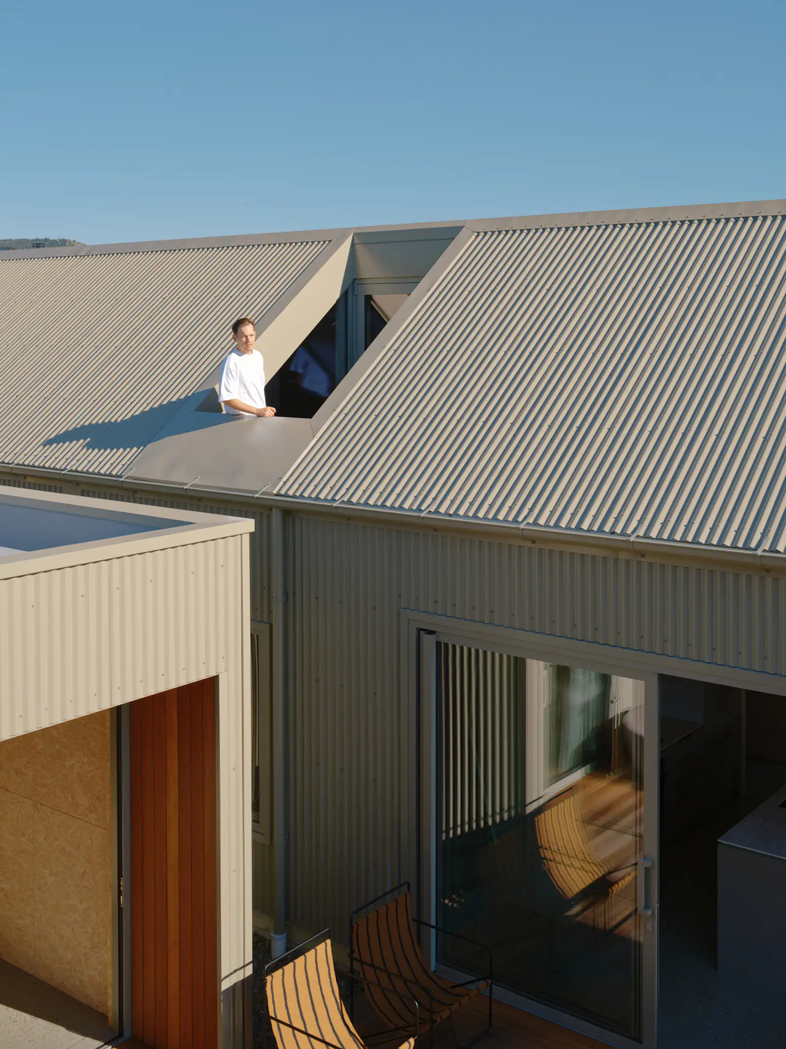 Photo 12 of 17 in Corrugated Steel Completely Covers This Mountain Home ...