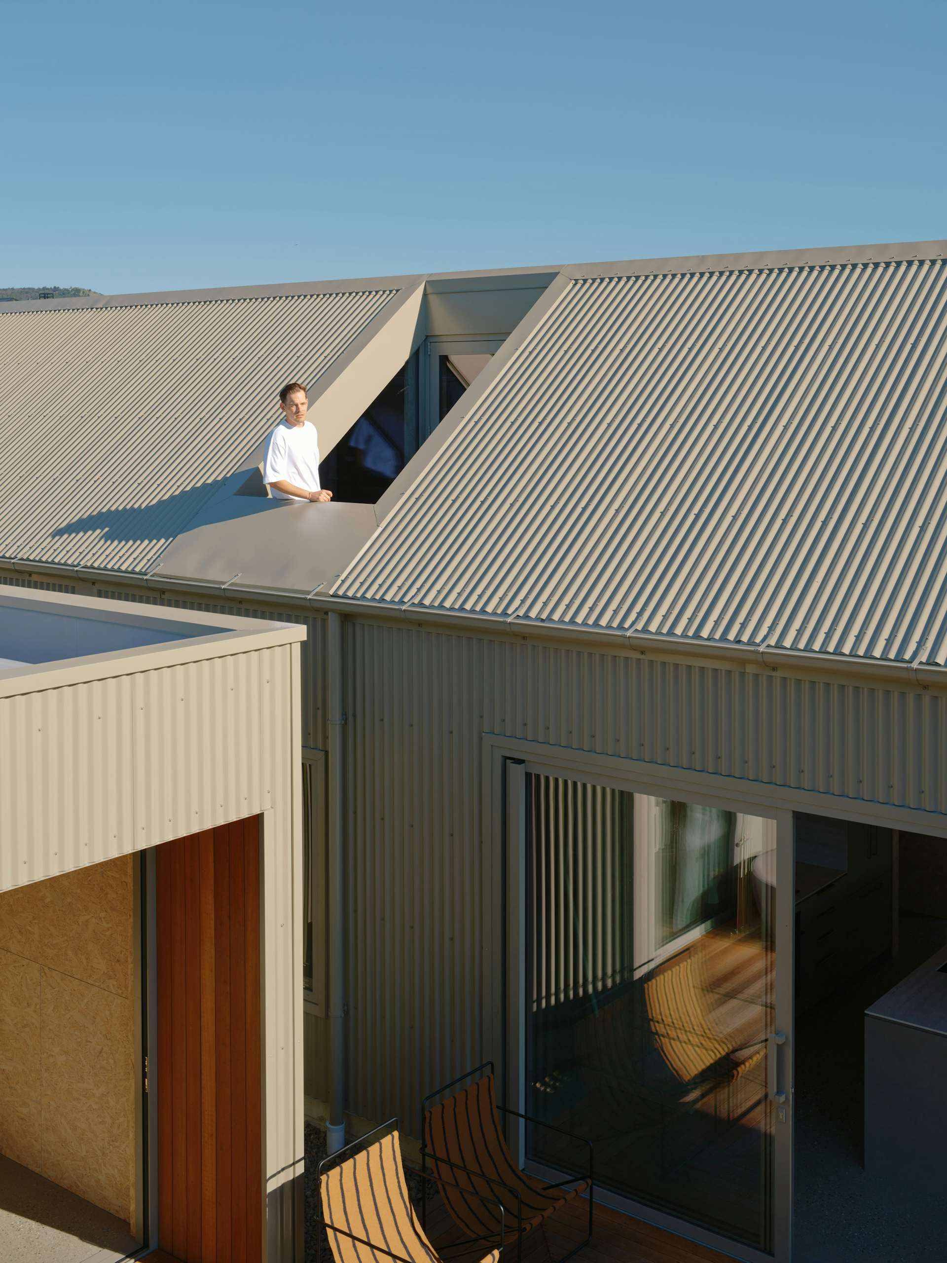 Photo 12 of 17 in Corrugated Steel Completely Covers This Mountain Home ...