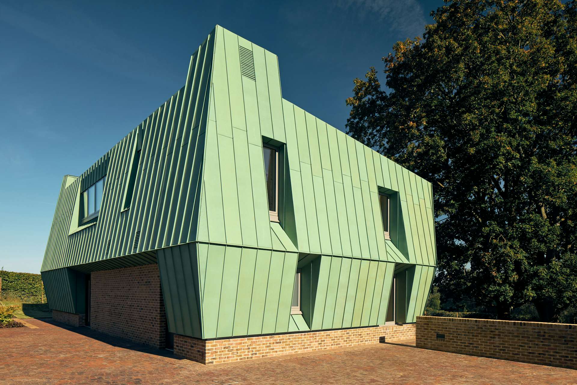 Photo 6 of 15 in This U.K. Home’s Oz-Green Shell Is Actually a ...