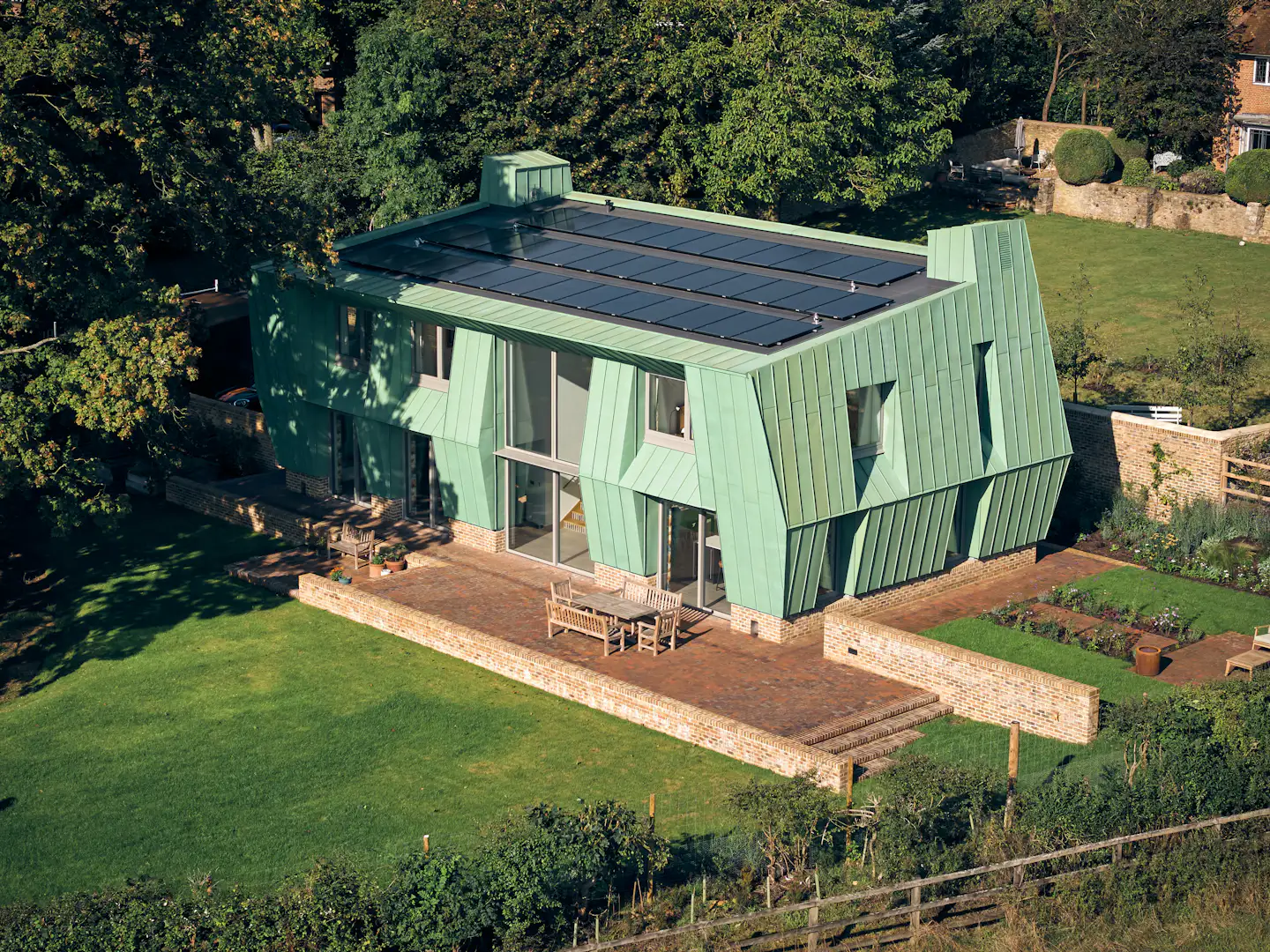 Photo 1 of 15 in This U.K. Home’s Oz-Green Shell Is Actually a ...