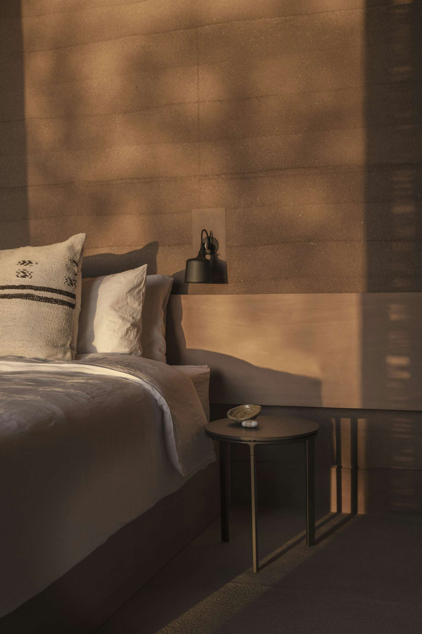 Photo 10 of 15 in A Dusty-Pink Rammed Earth Home Appears to Rise Out of ...