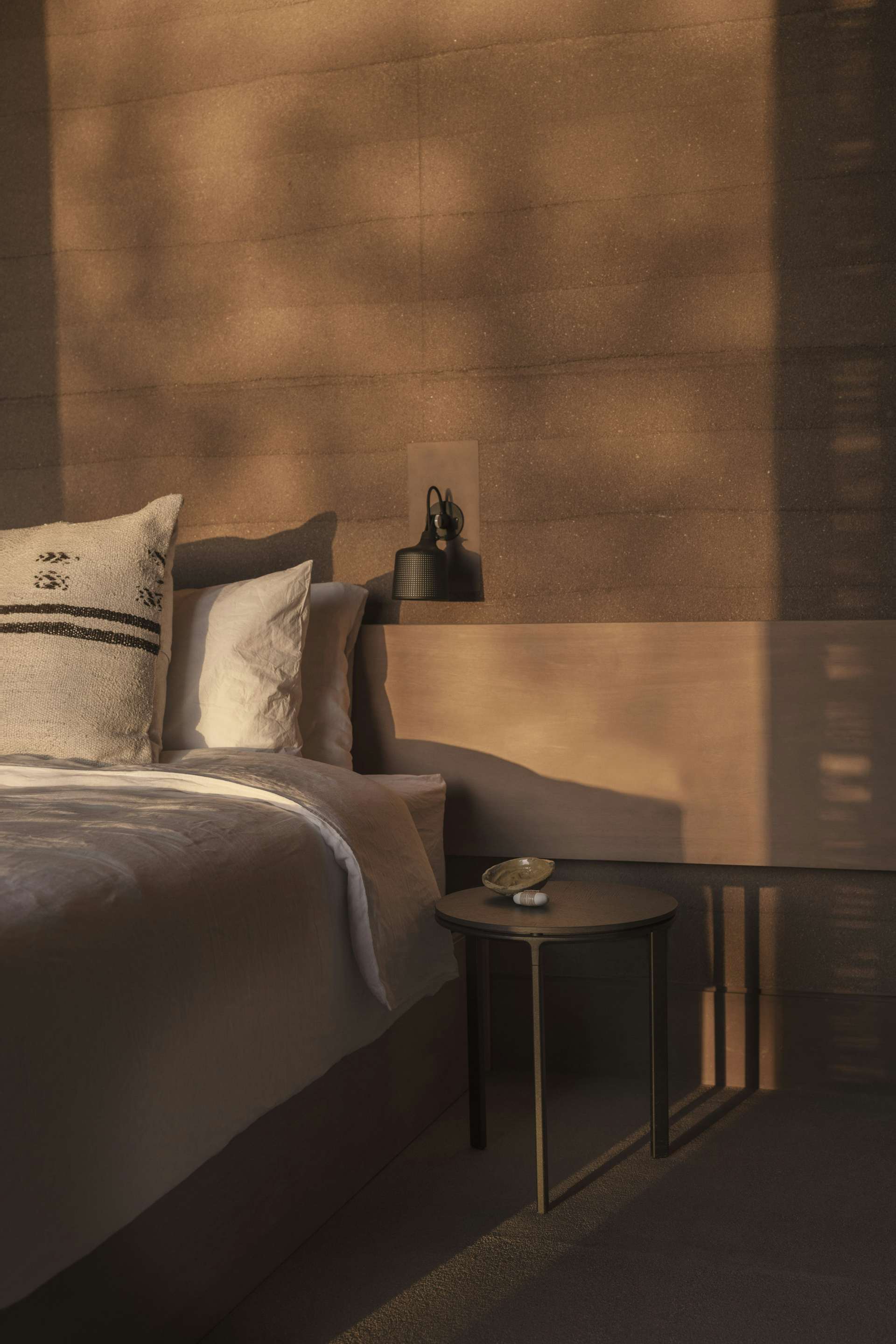 Photo 10 of 15 in A Dusty-Pink Rammed Earth Home Appears to Rise Out of ...