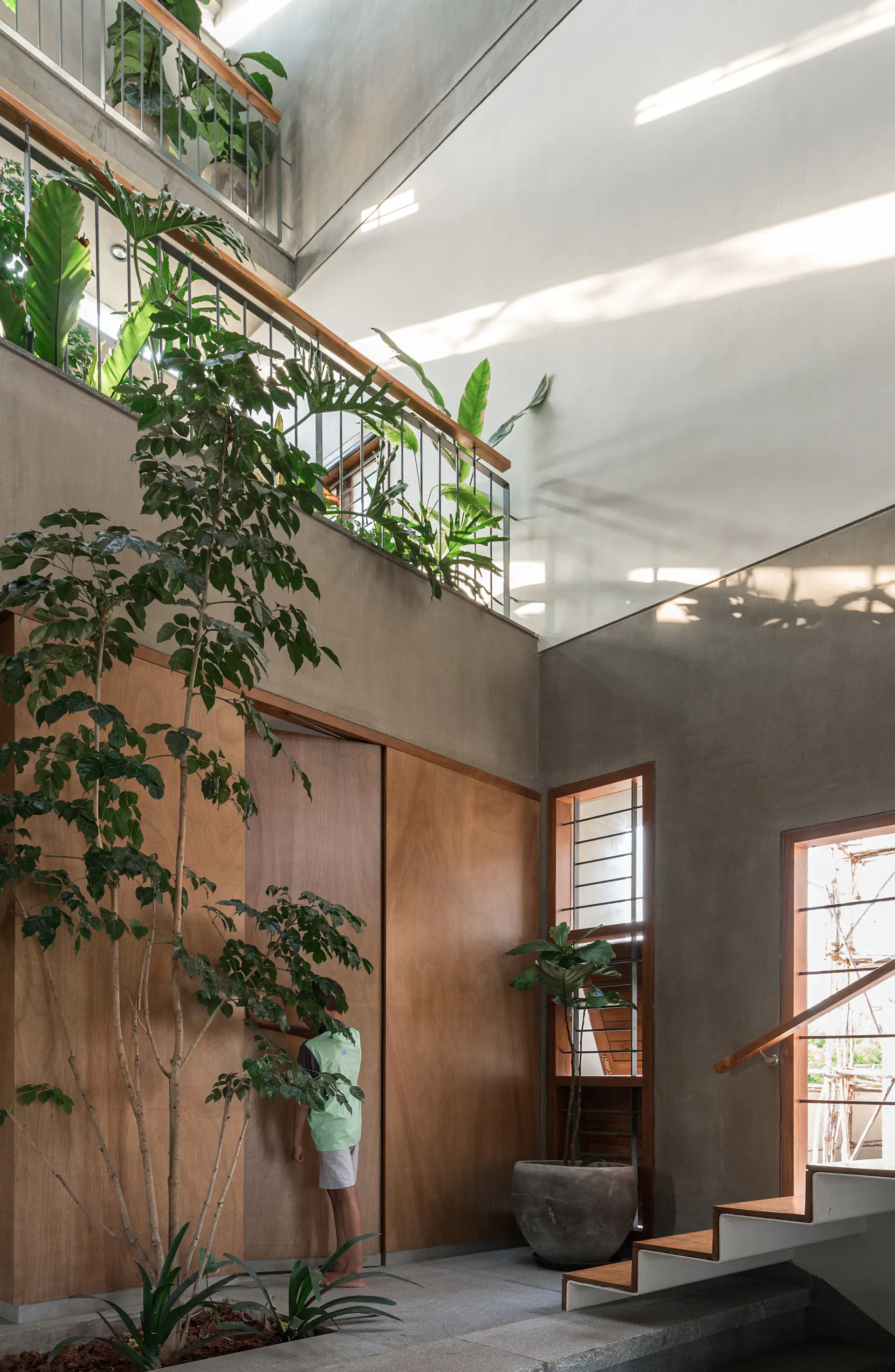 Photo 5 of 20 in The Skylight Steals the Show at This Vertical Concrete ...